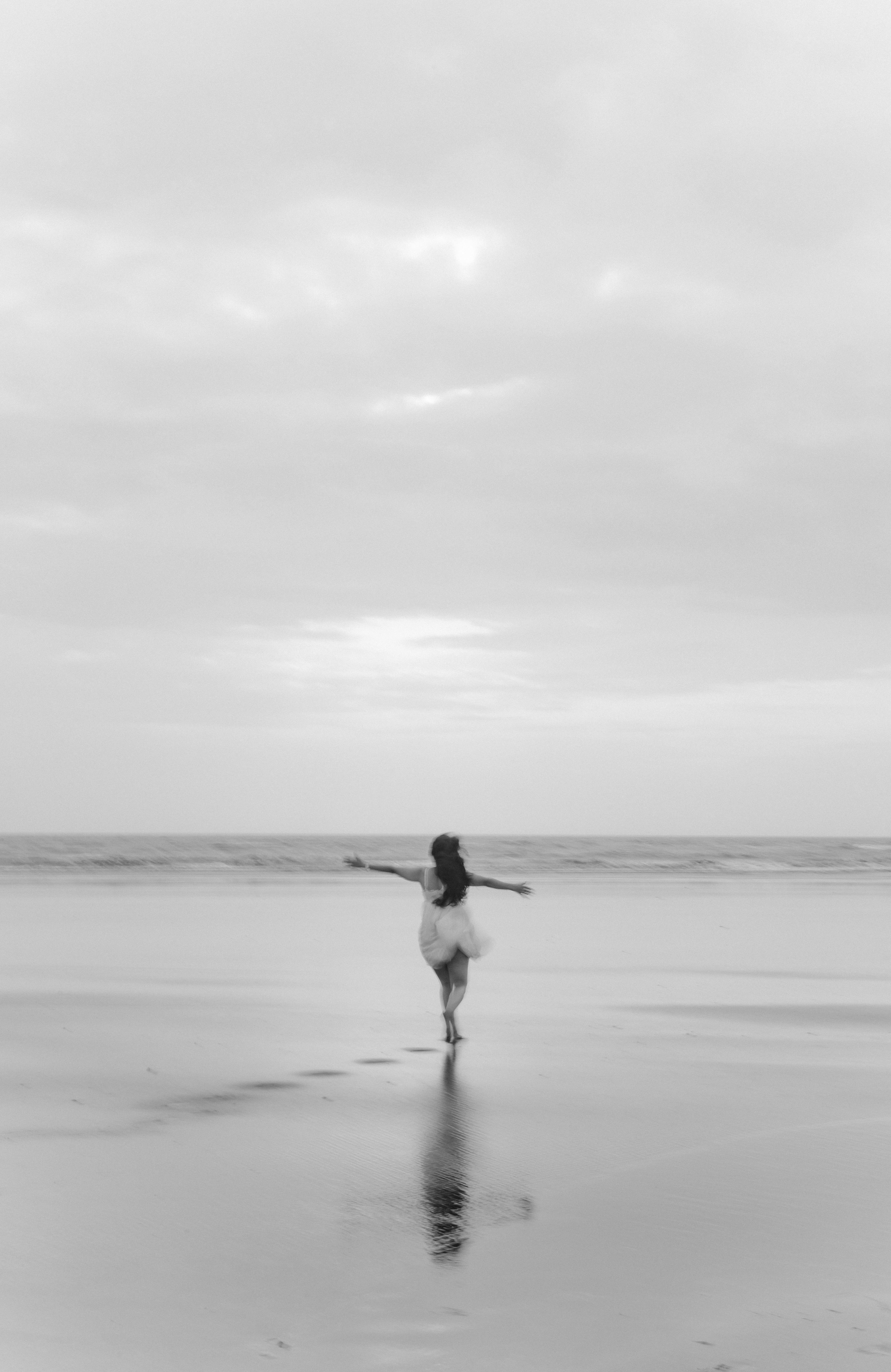 Model in Bodysuit and Transparent Dress · Free Stock Photo