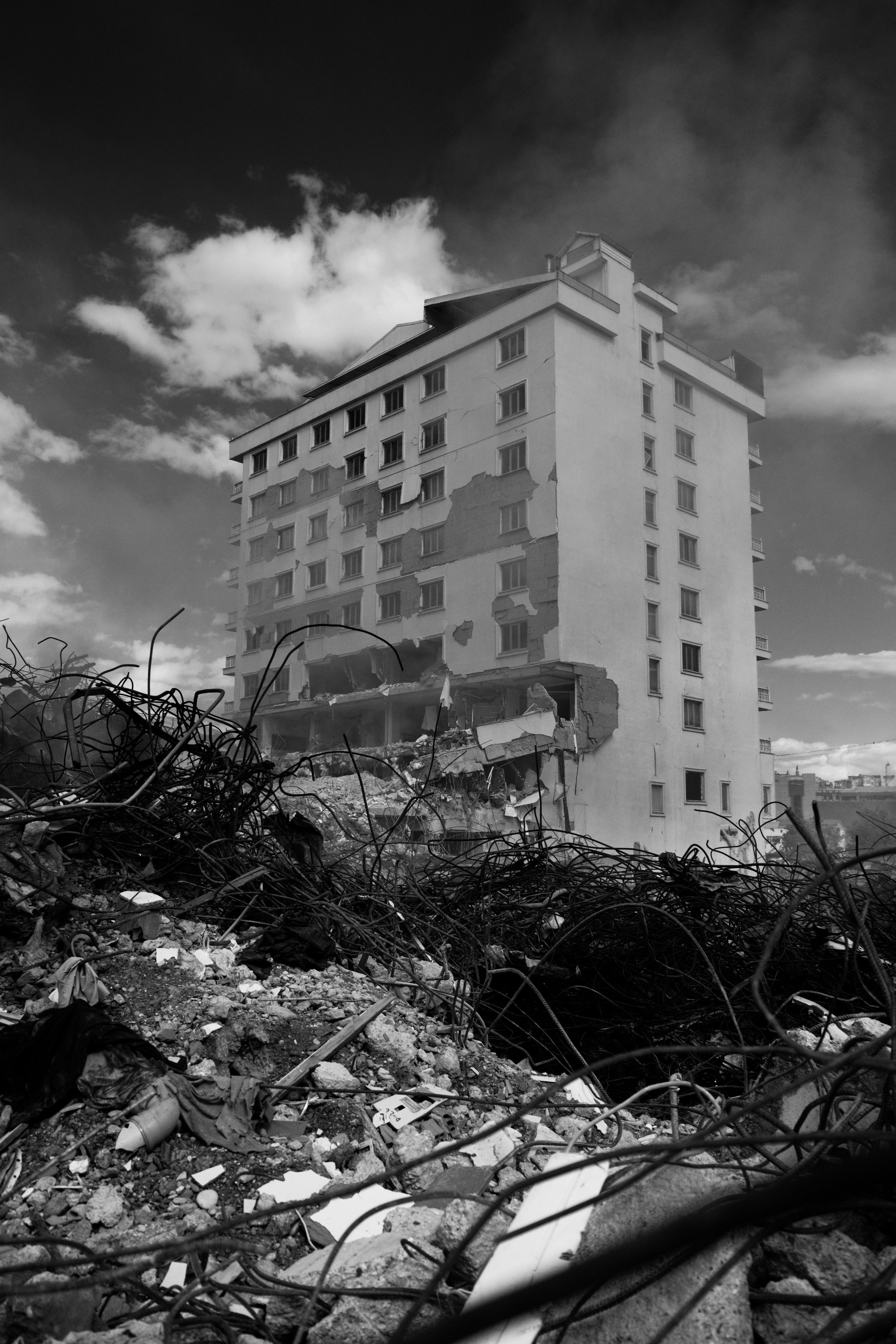 Black and White Shot of a Damaged Residential Building · Free Stock Photo