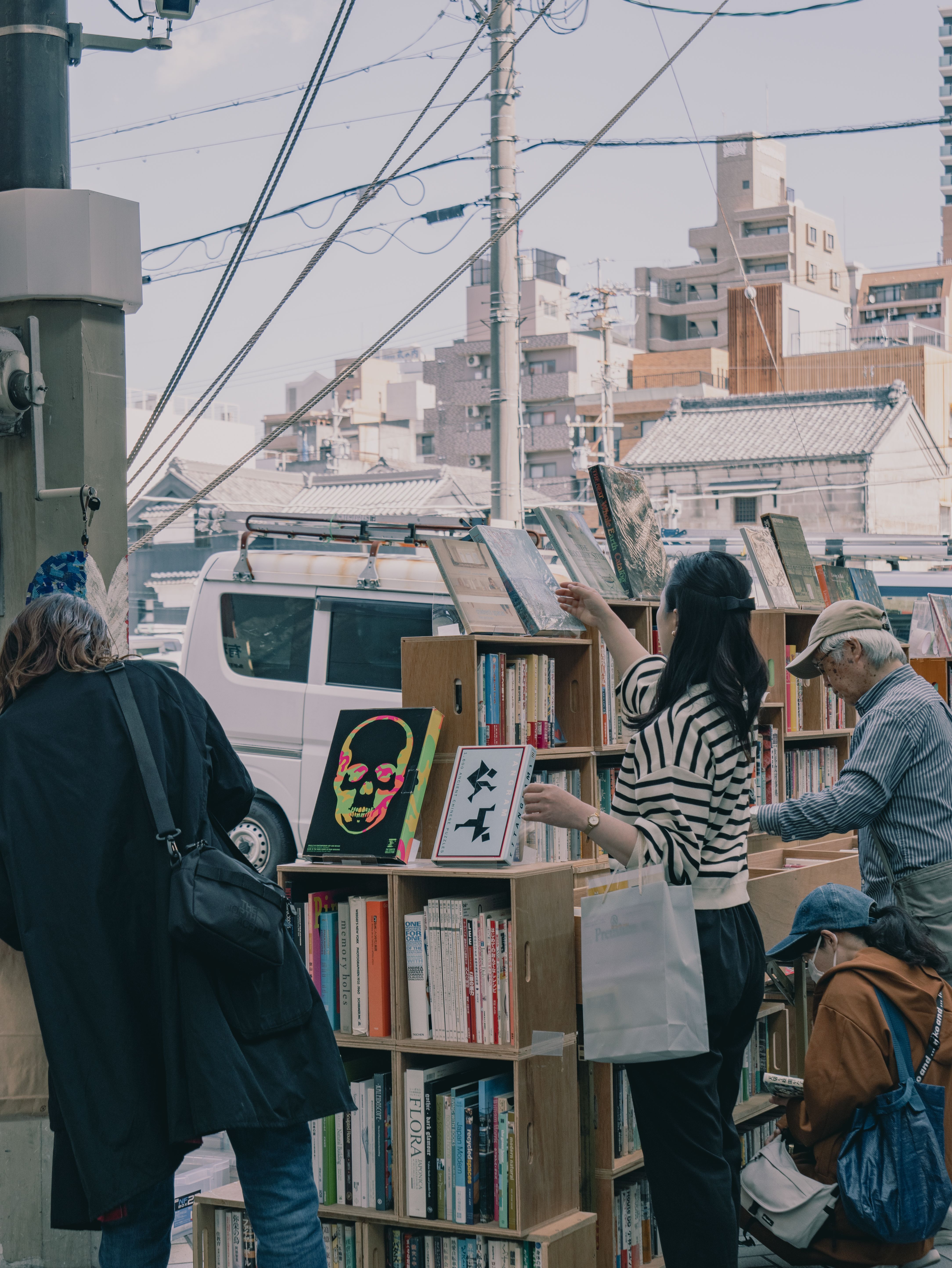 People Walking around an Old Book Market in City · Free Stock Photo