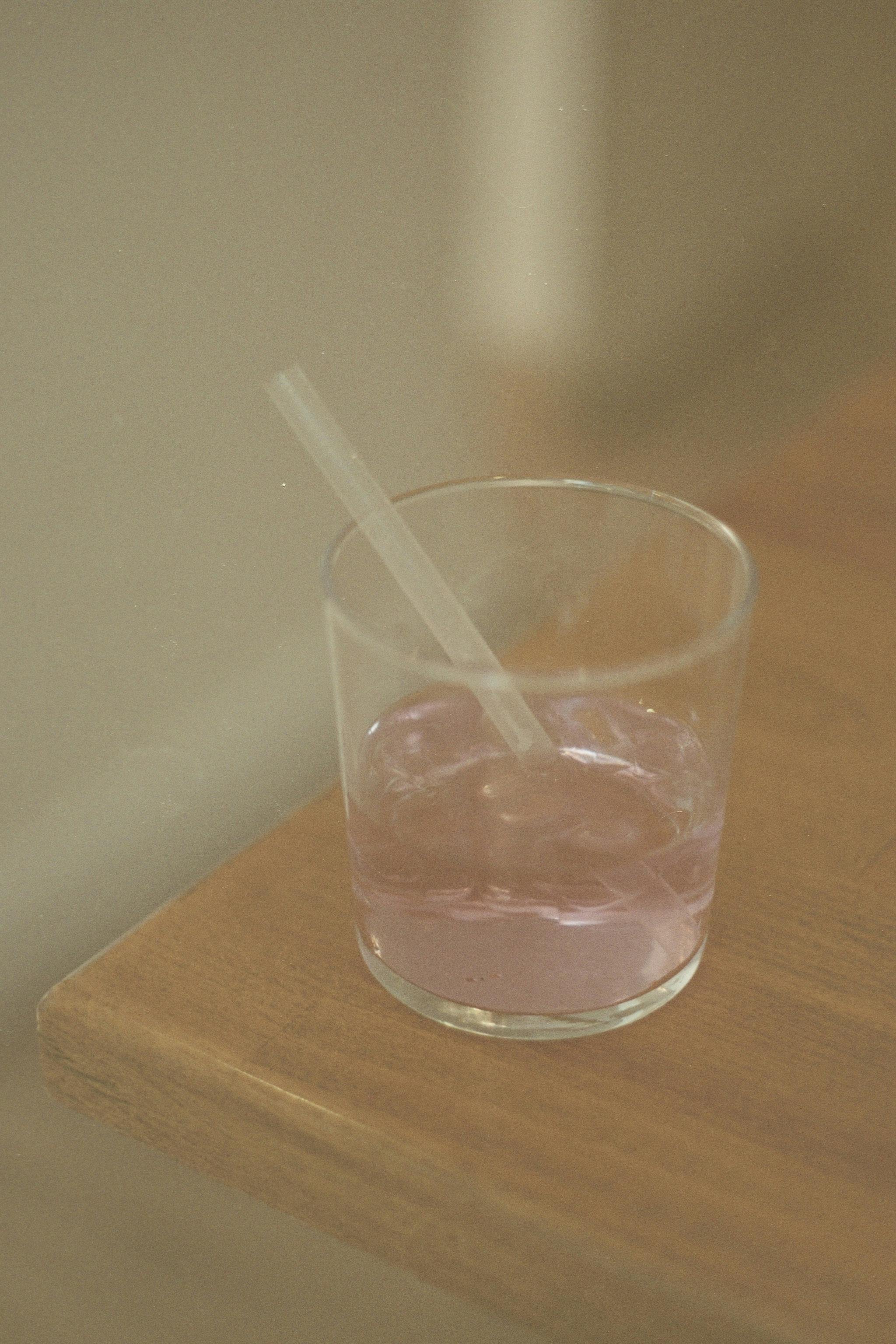 Glass with Straw and Purple Liquid · Free Stock Photo