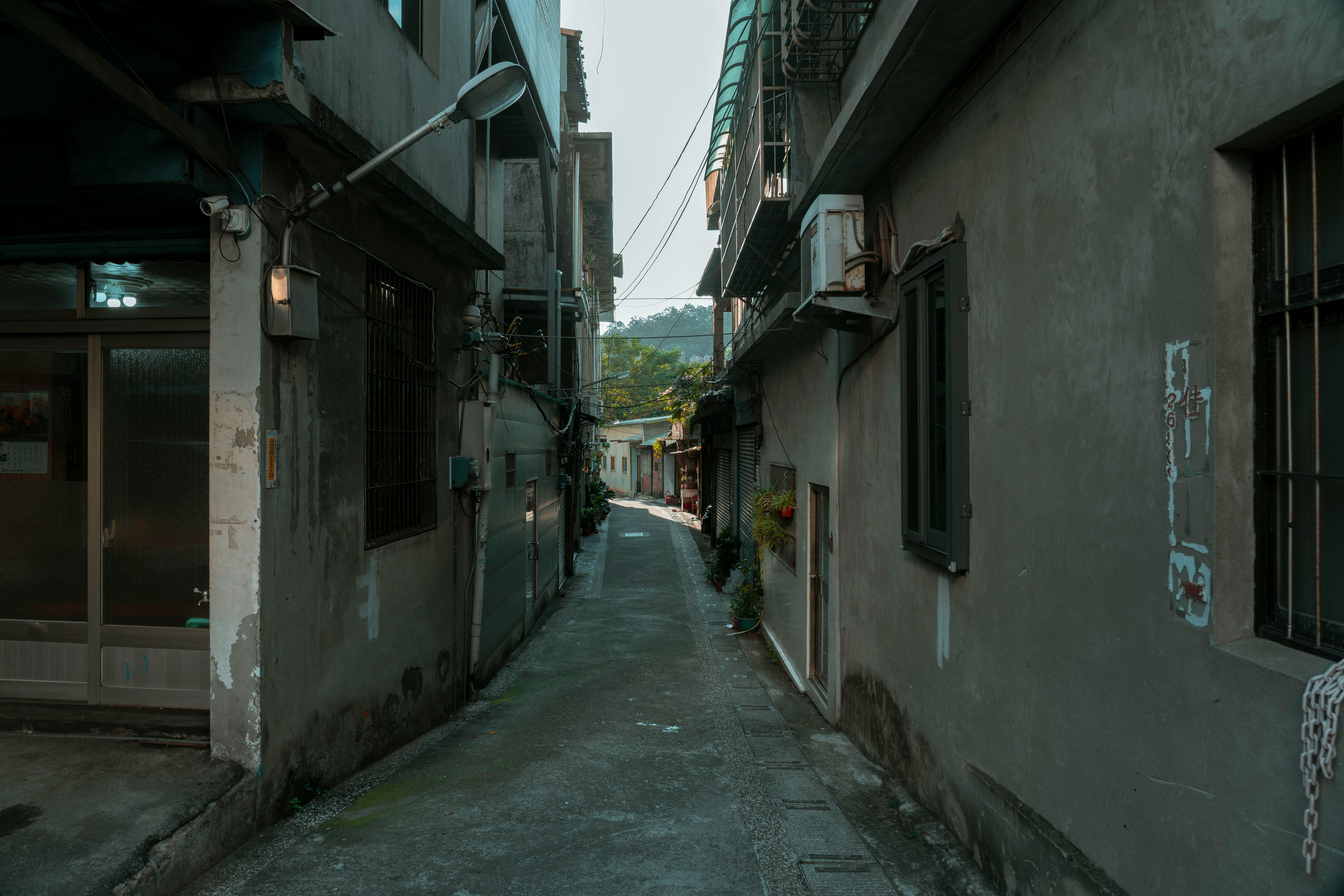 Photo of Alley Between Buildings · Free Stock Photo