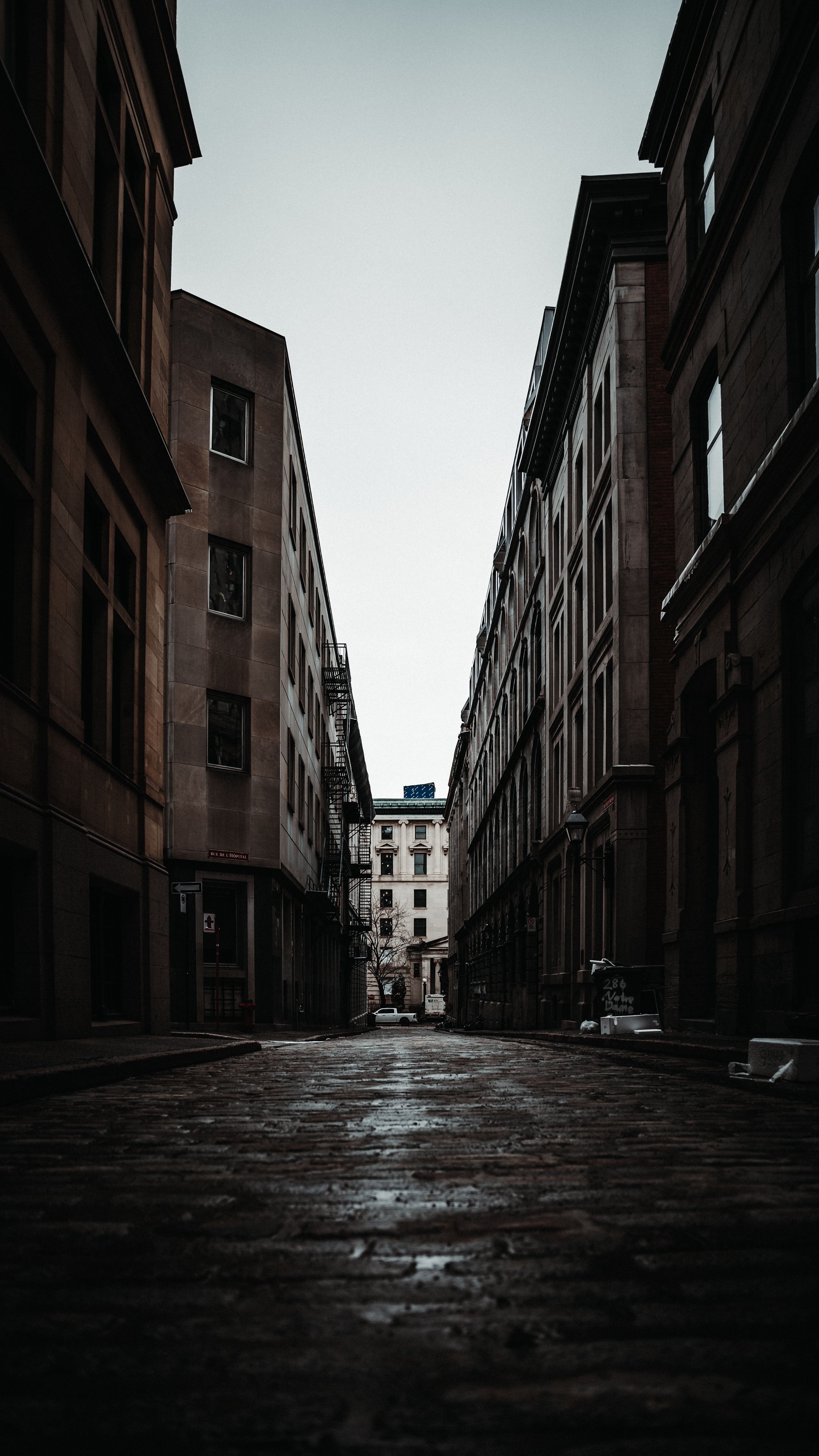View of an Empty, Narrow Alley between Residential Buildings · Free ...