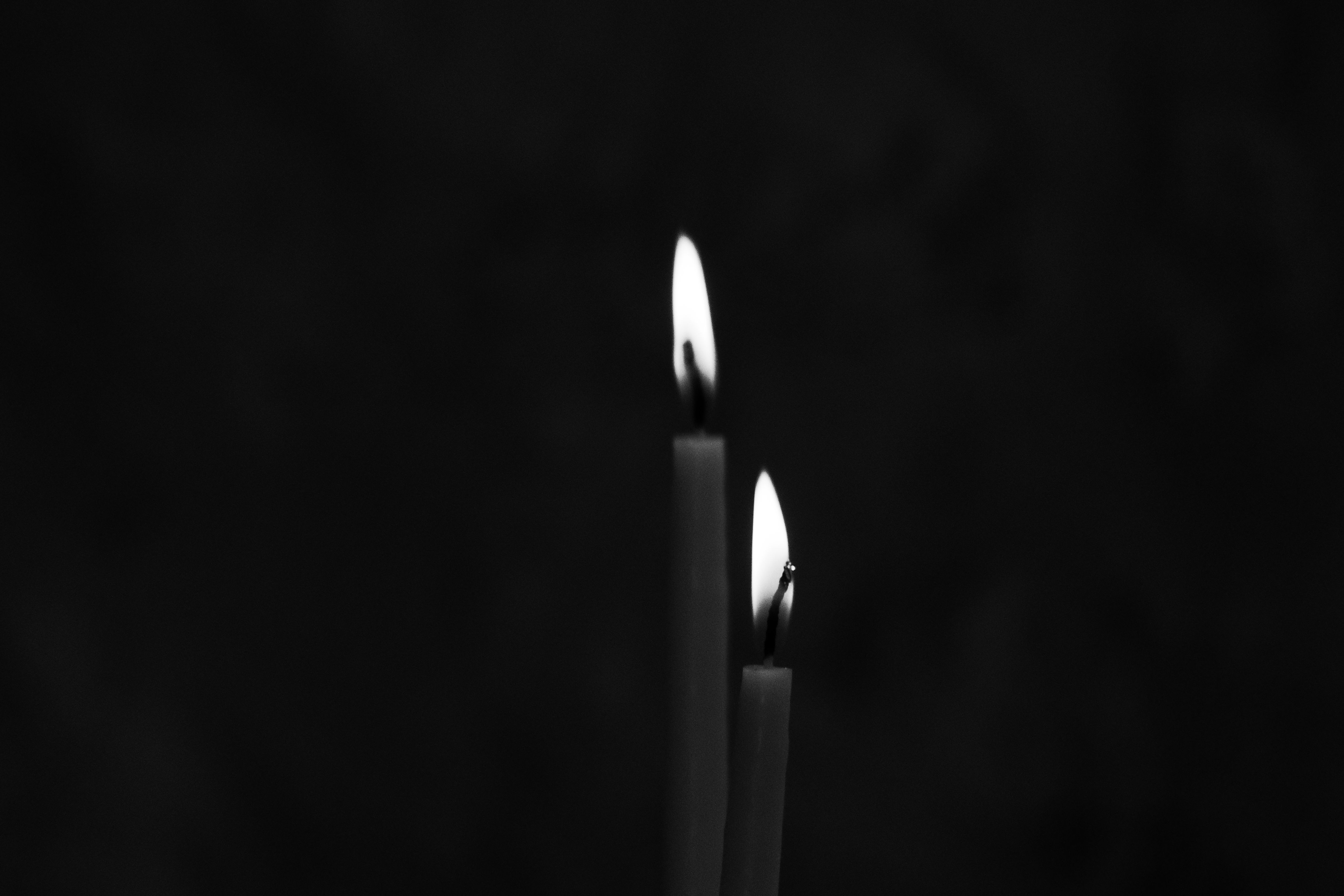 Close-up of Two Burning Candlesticks · Free Stock Photo