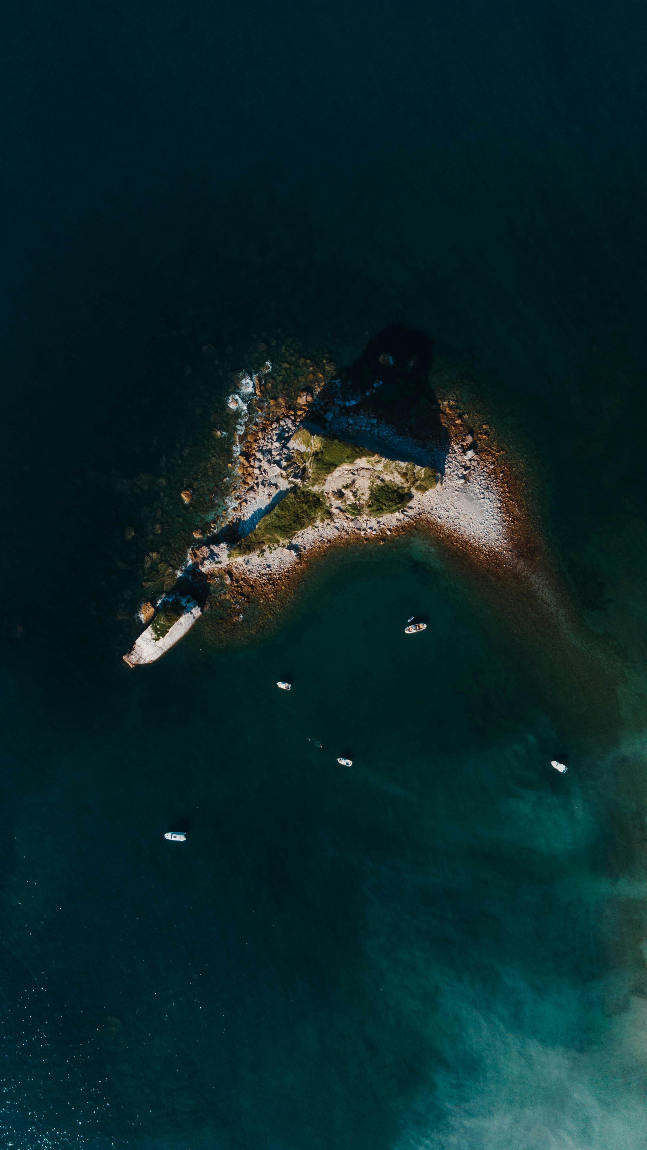 Aerial View of Tiny Rocky Island · Free Stock Photo