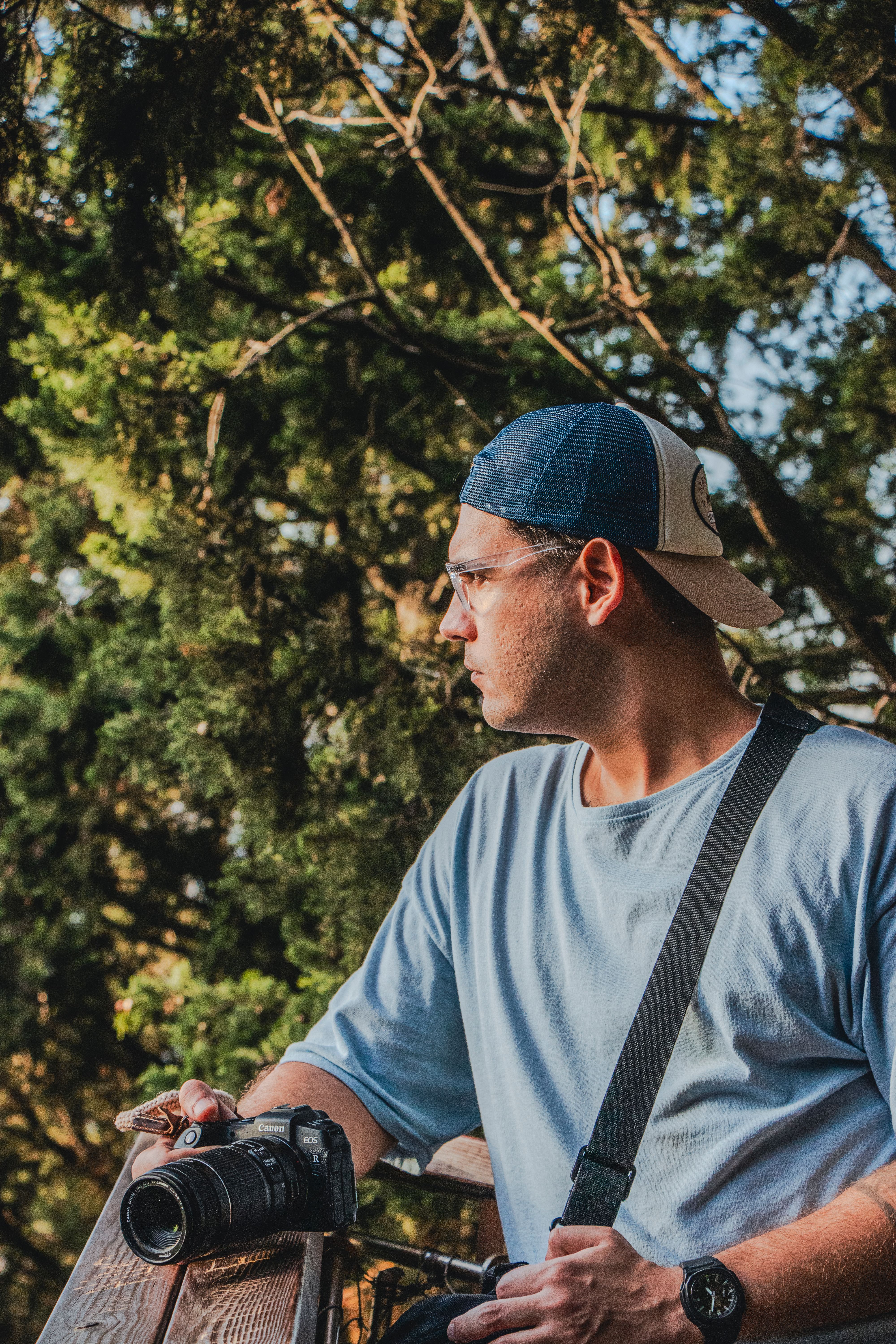Man Looking in Binoculars during Sunset · Free Stock Photo