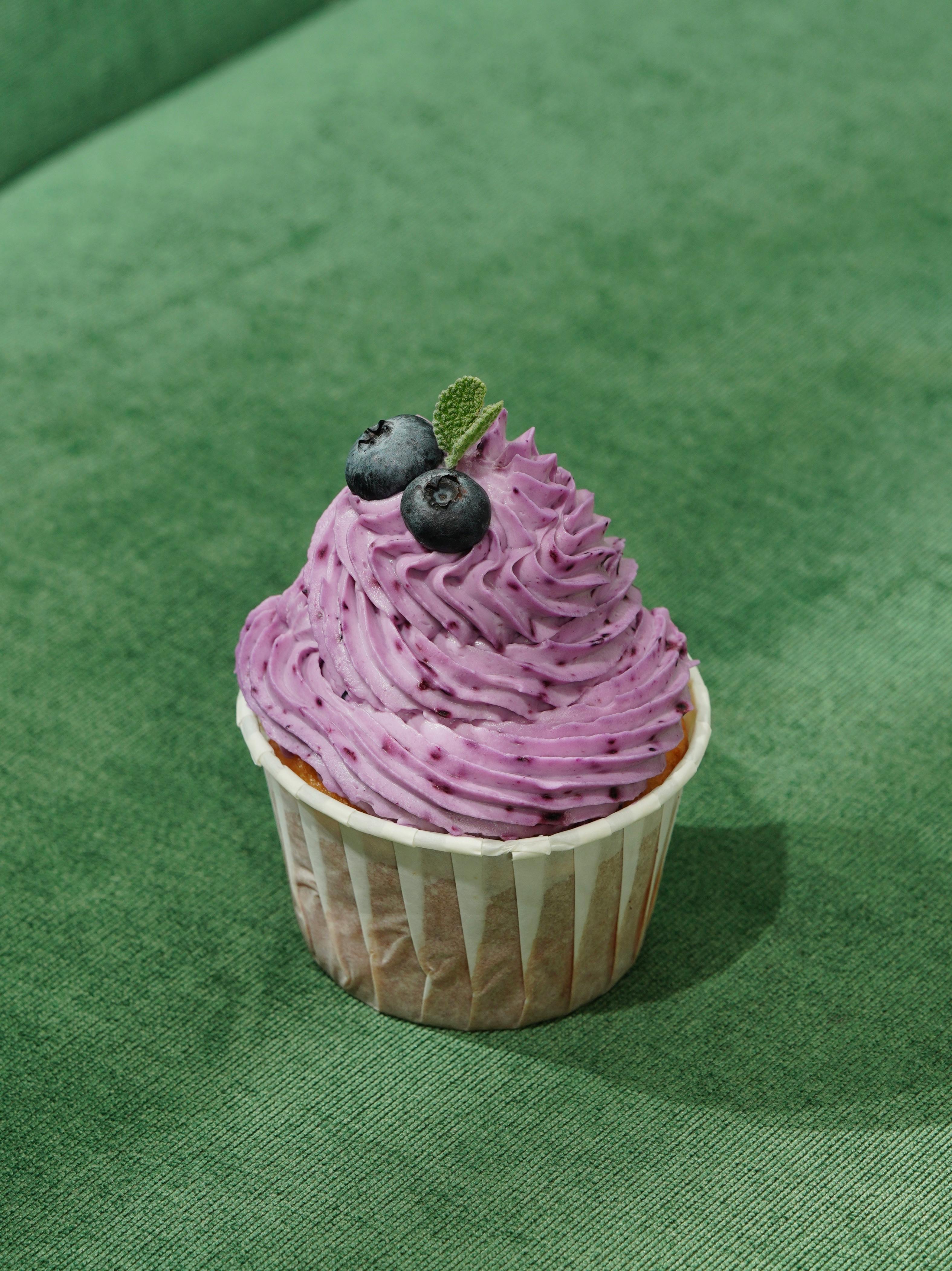 Brown Cupcake With Pink Icing Macro Photographyu · Free Stock Photo