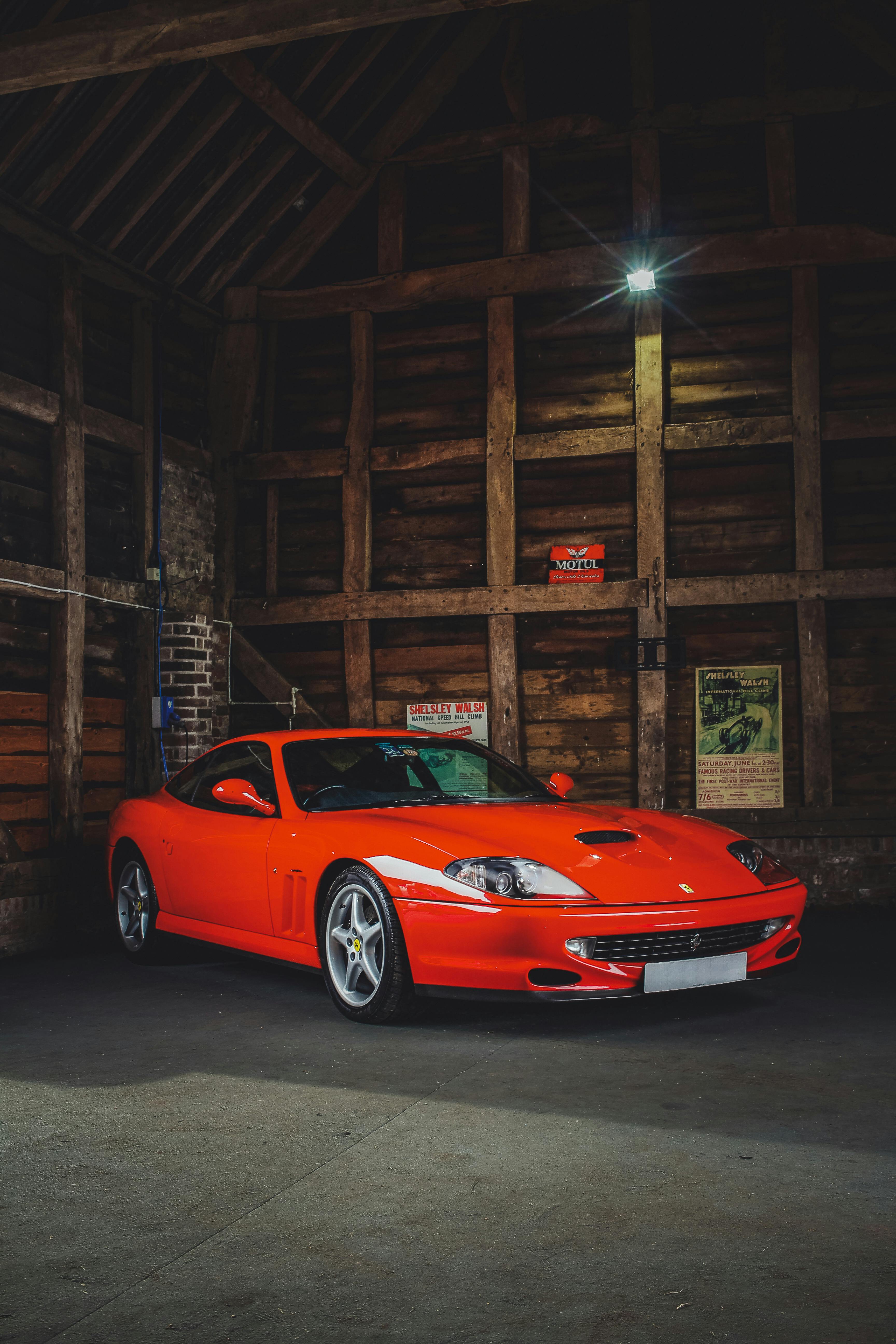 Red Car in a Garage · Free Stock Photo
