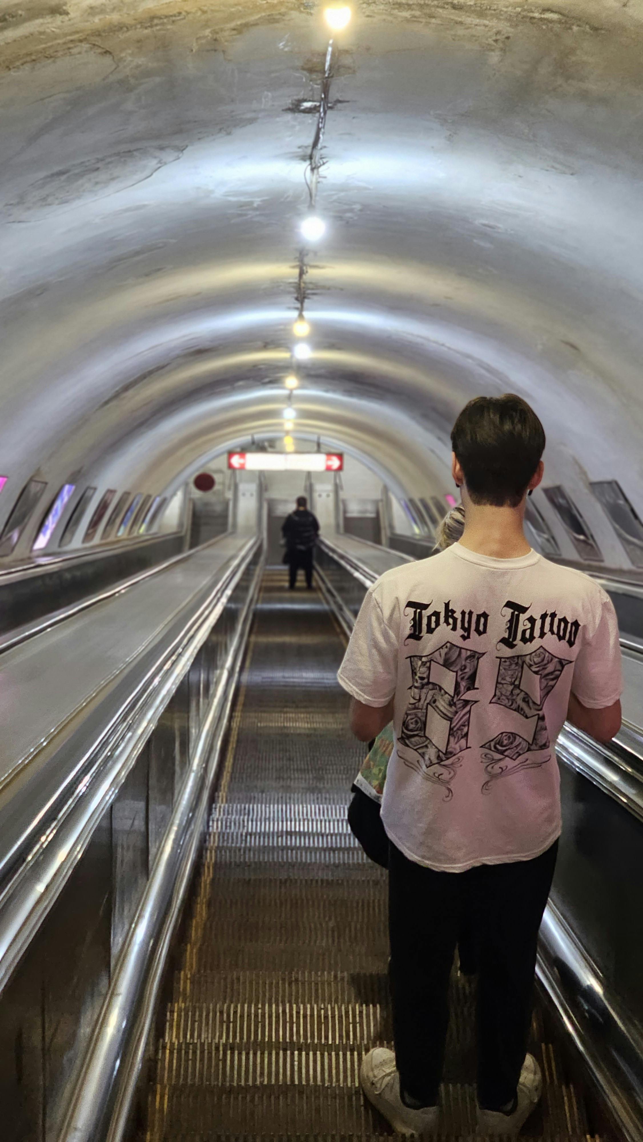 Man on Escalator in Underground · Free Stock Photo