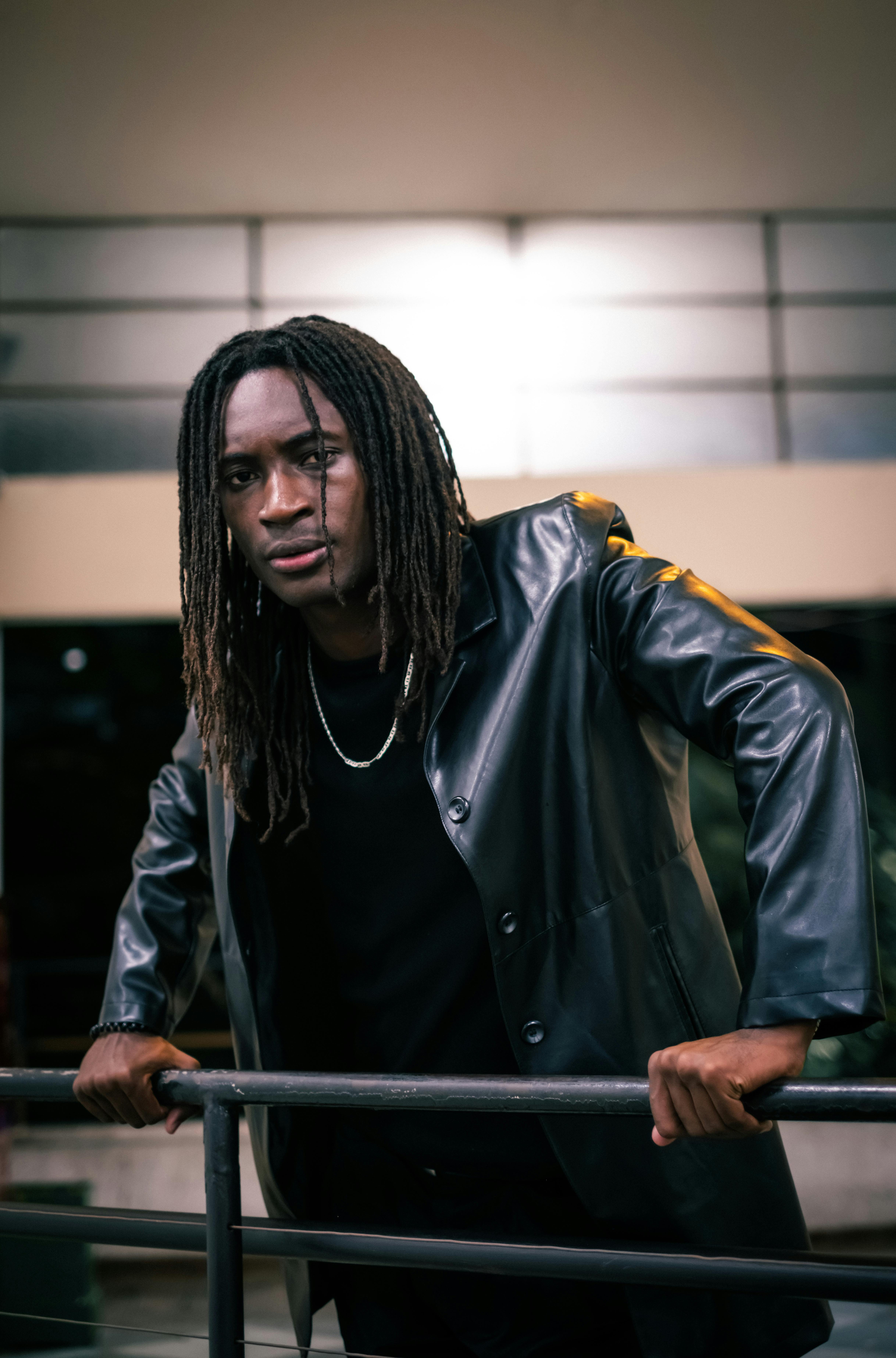 Portrait of a Male Model Wearing a Black Coat · Free Stock Photo
