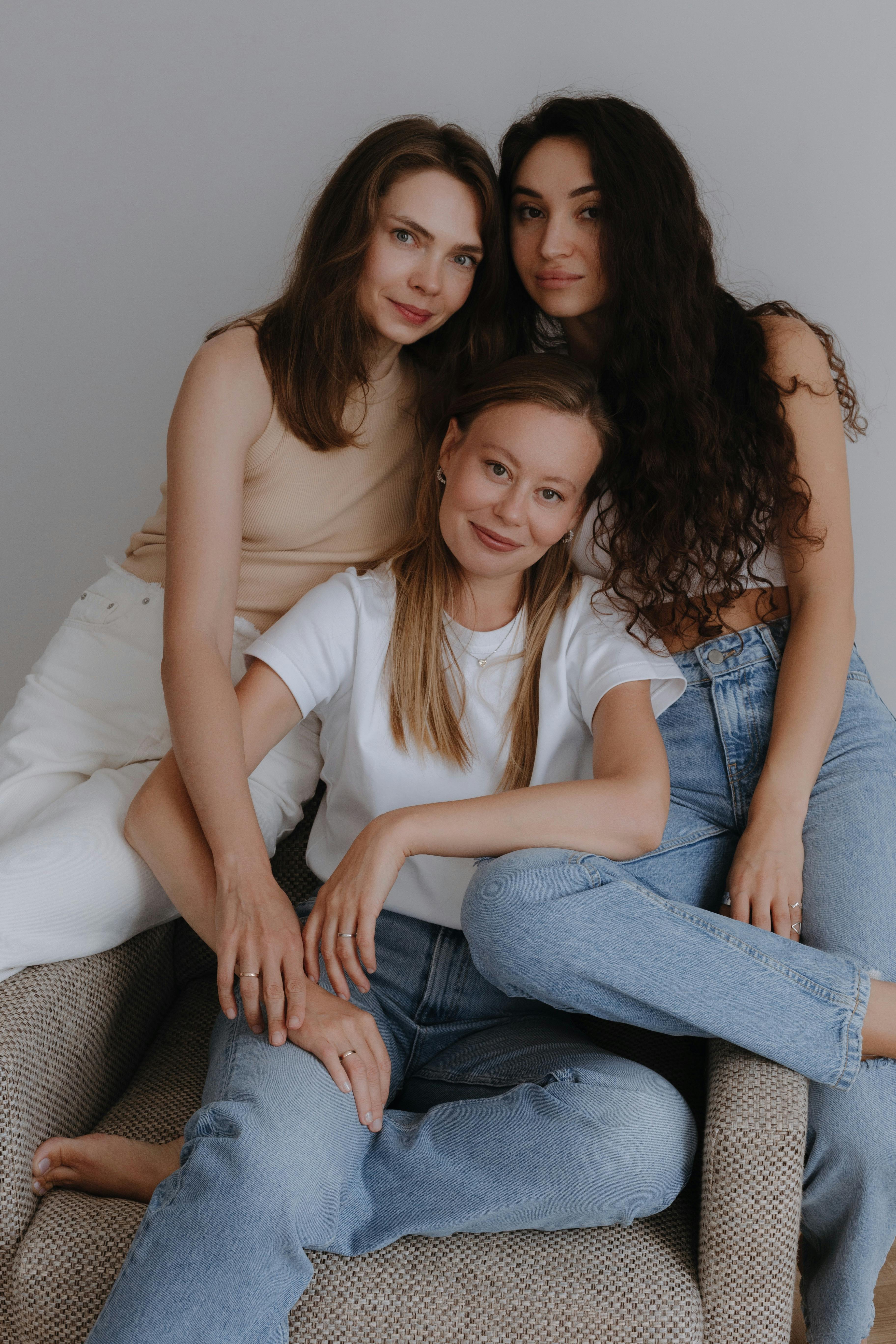 Woman Together on Armchair · Free Stock Photo