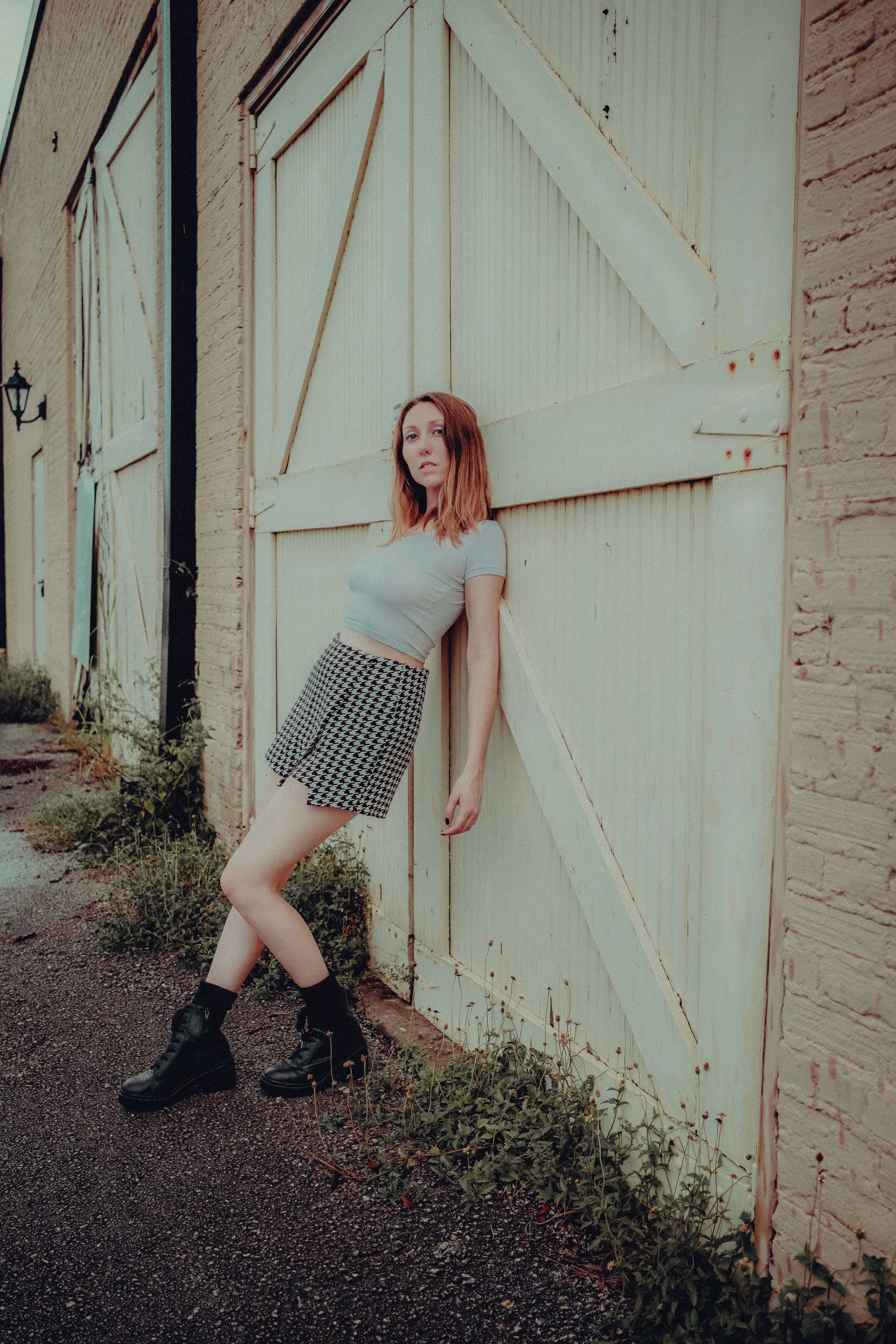 Girl Leaning on the Gate · Free Stock Photo