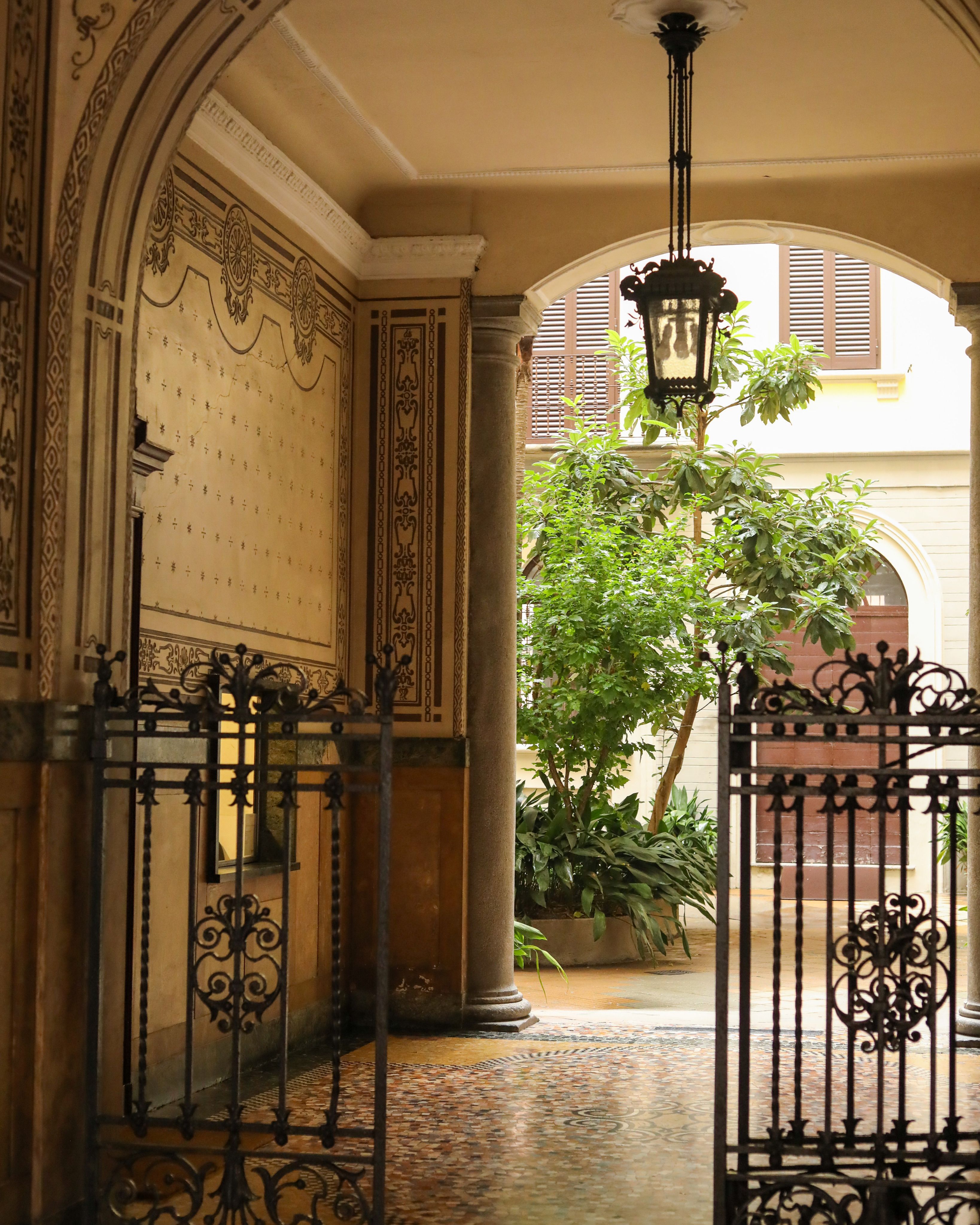 Lantern Hanging over an Open Gate · Free Stock Photo