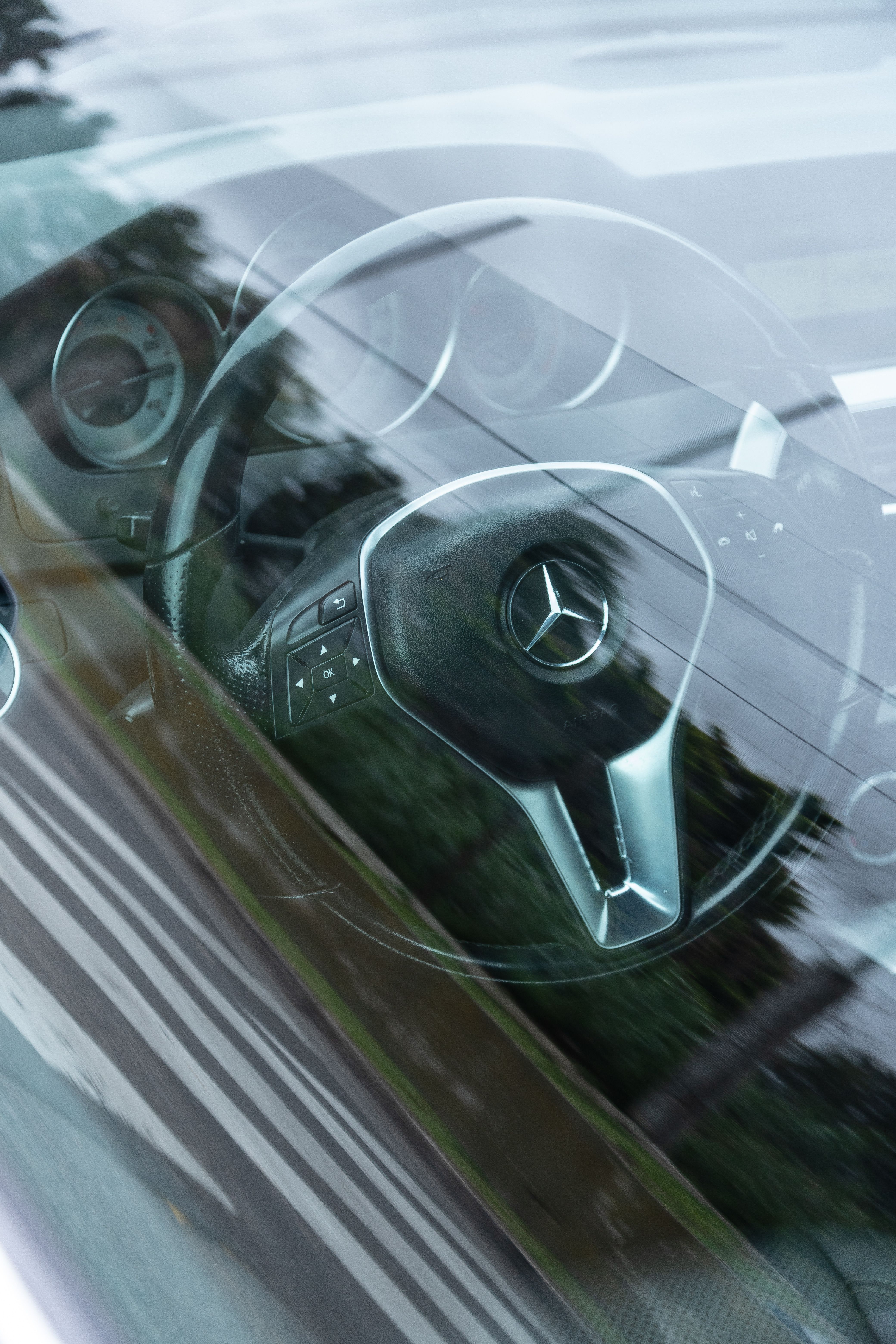 A Steering Wheel Through the Window · Free Stock Photo