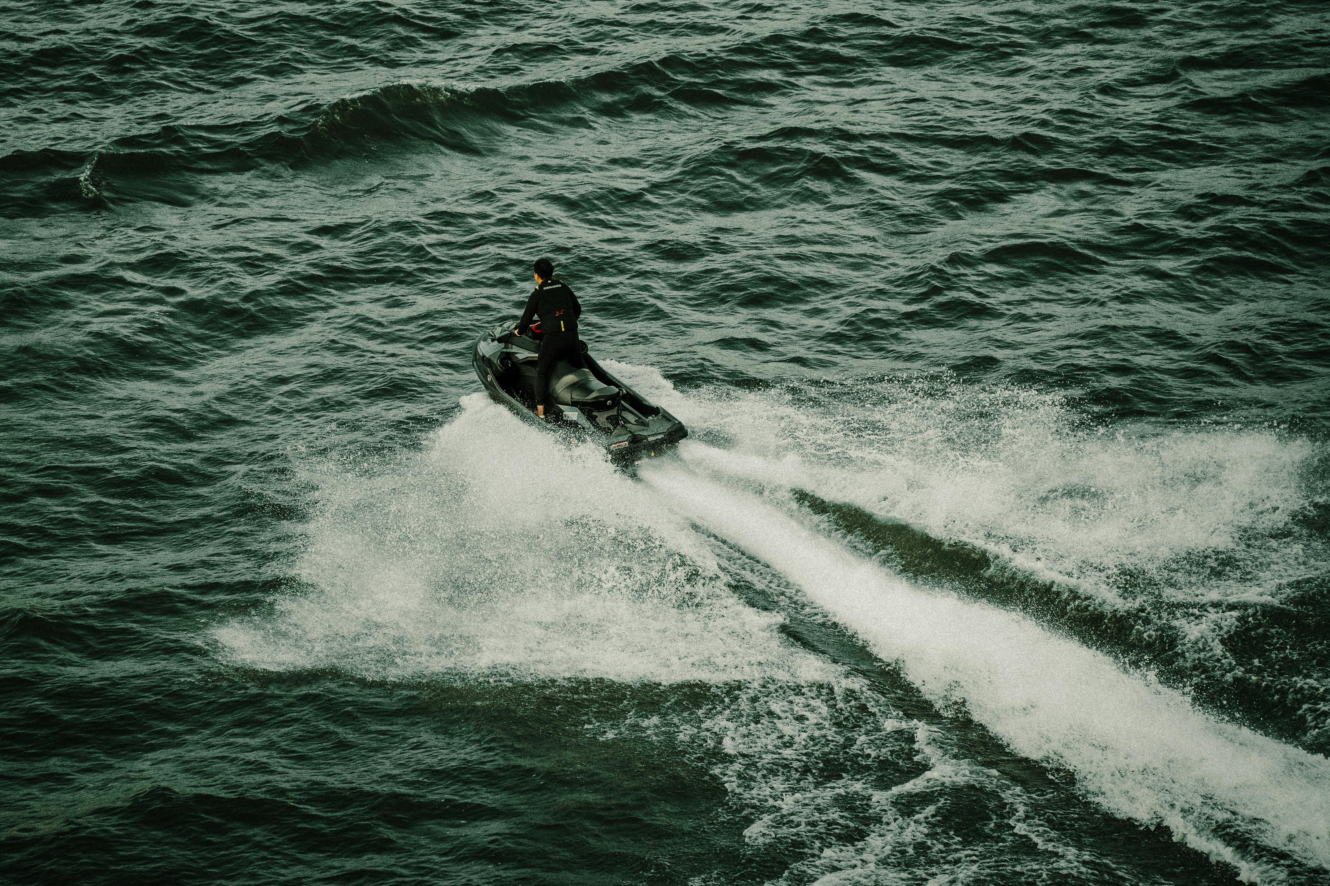 Man Riding Jet Ski · Free Stock Photo