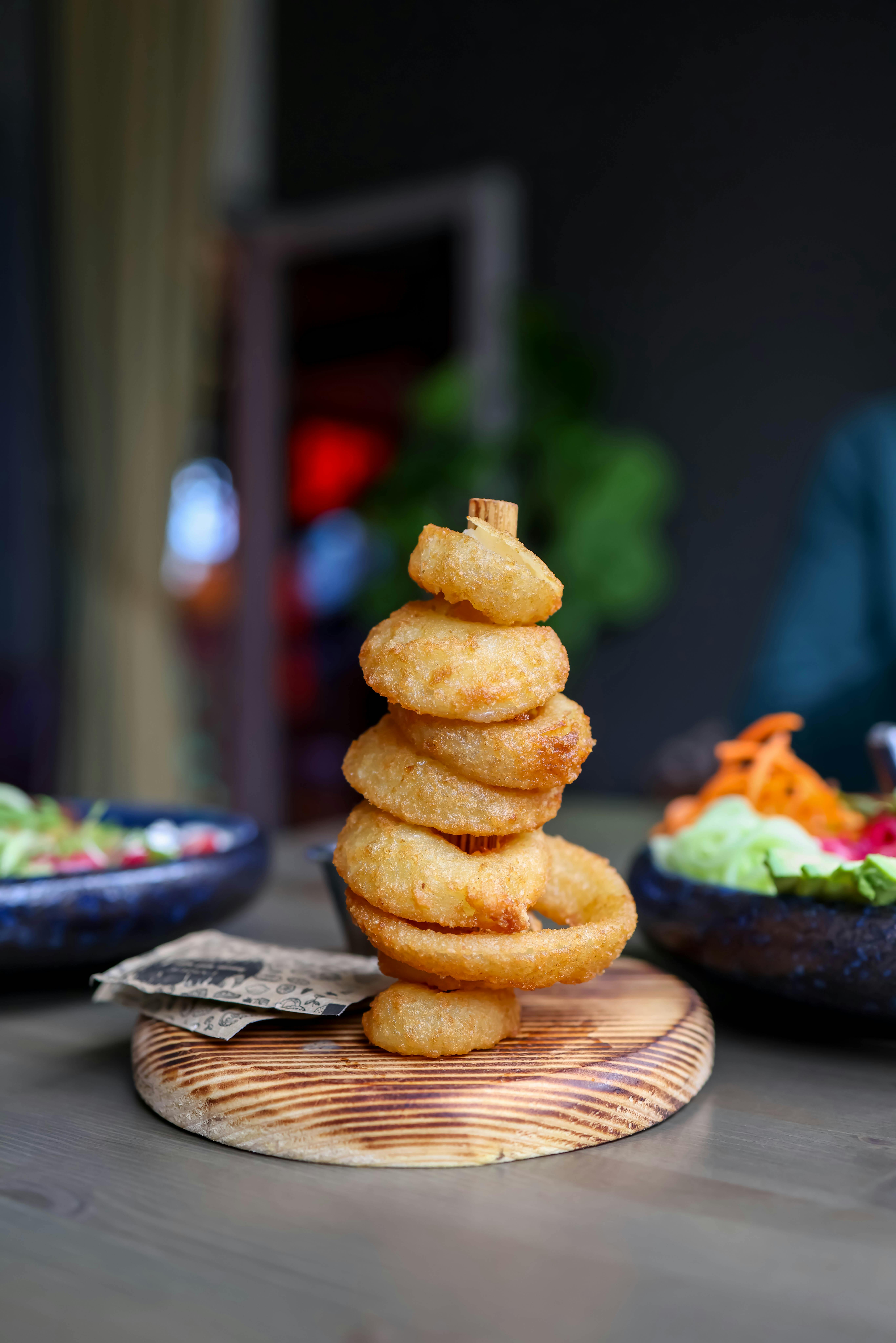 Close-up of Onion Rings Served in a Restaurant · Free Stock Photo