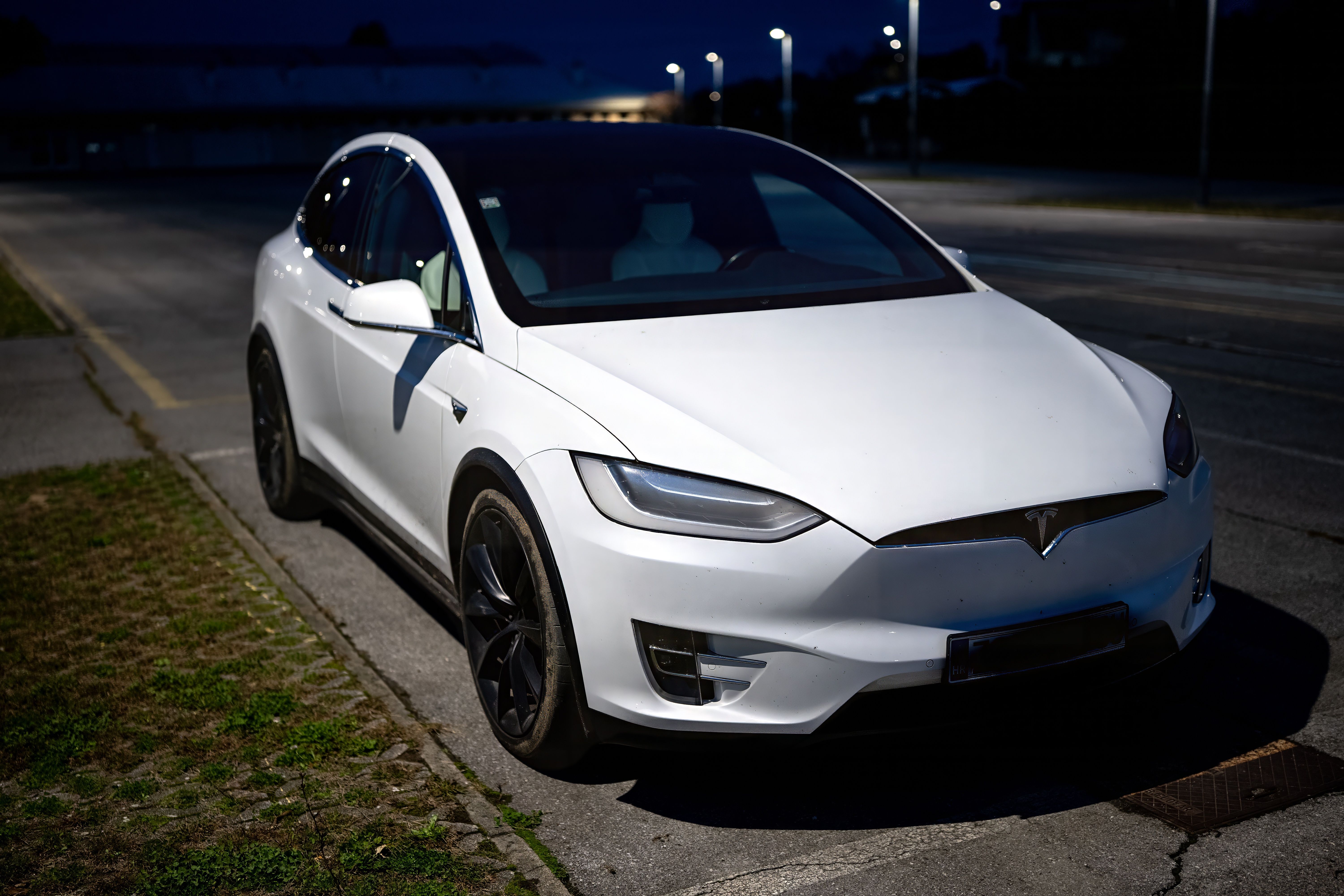 Night Photo of a White Car · Free Stock Photo