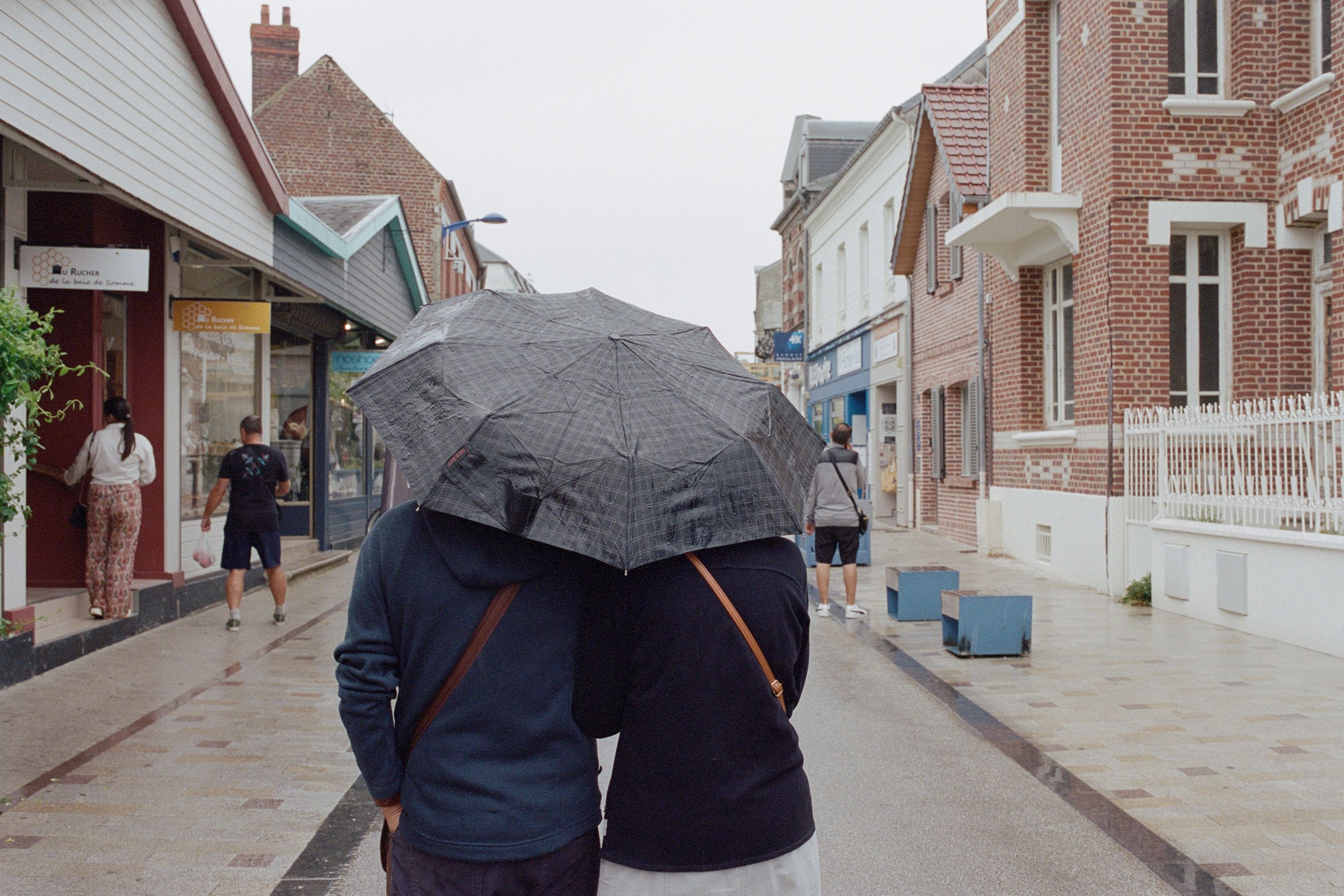Person Holding An Umbrella · Free Stock Photo