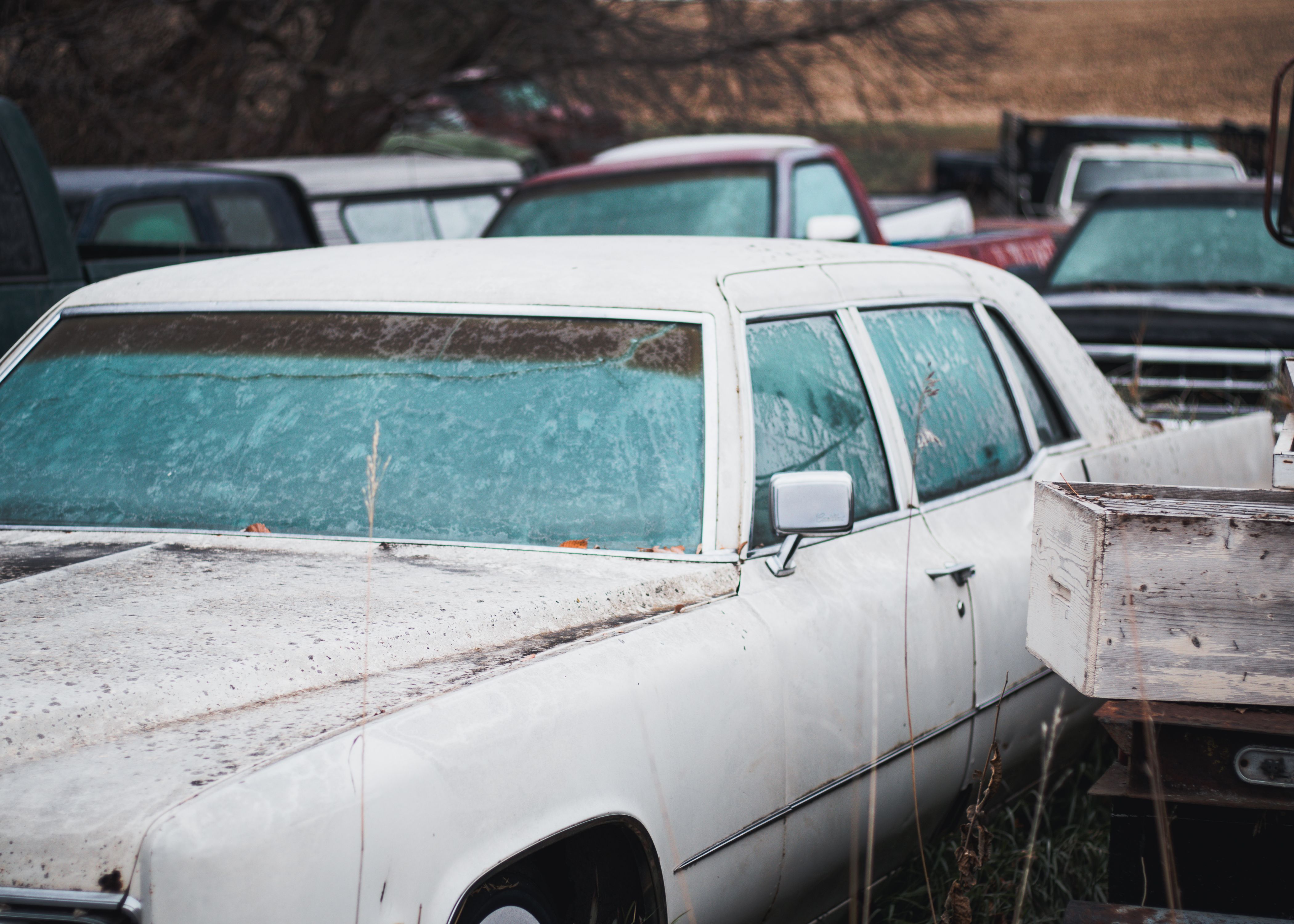 Abandoned Dirty White Car · Free Stock Photo