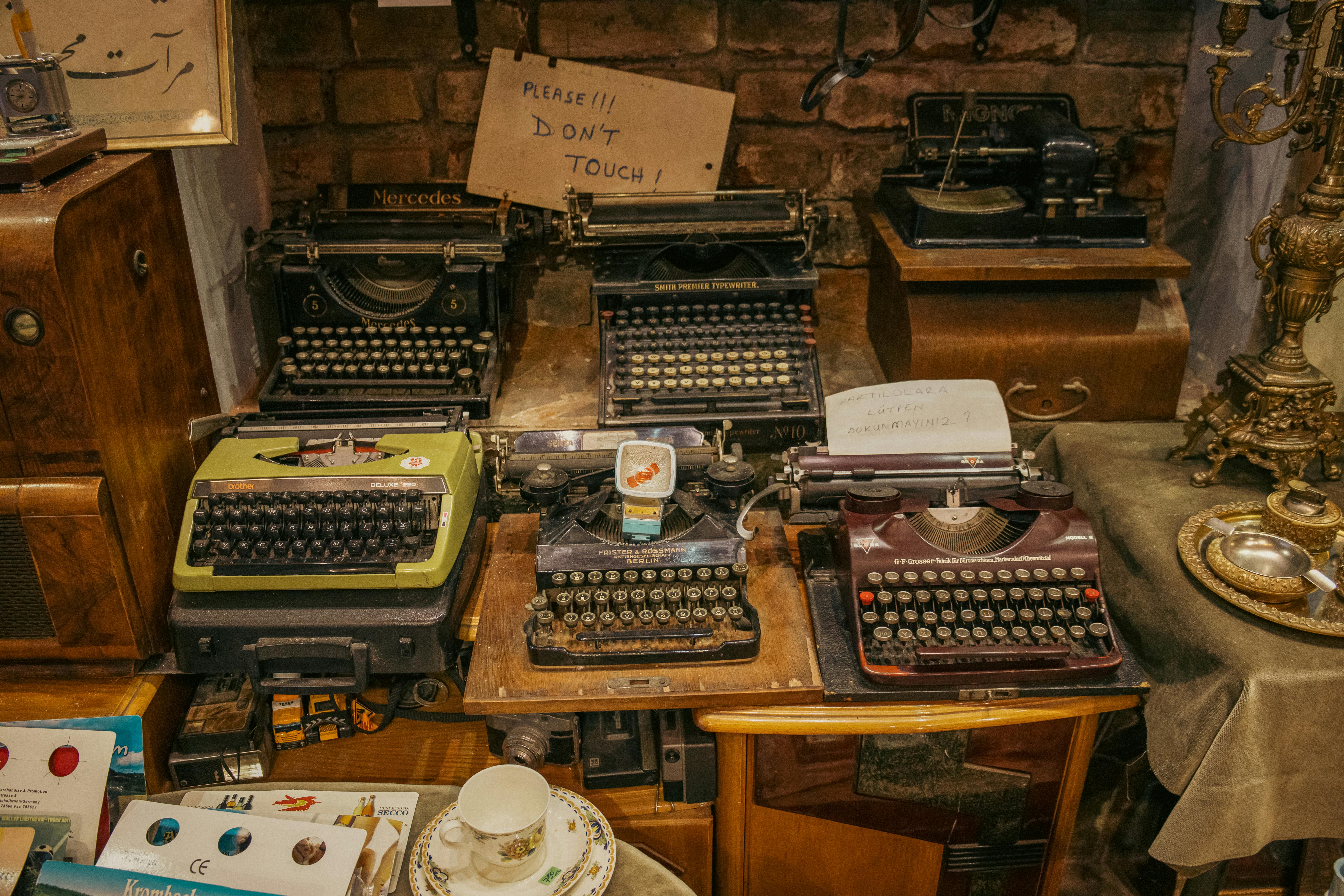 A room with old typewriters and other items · Free Stock Photo