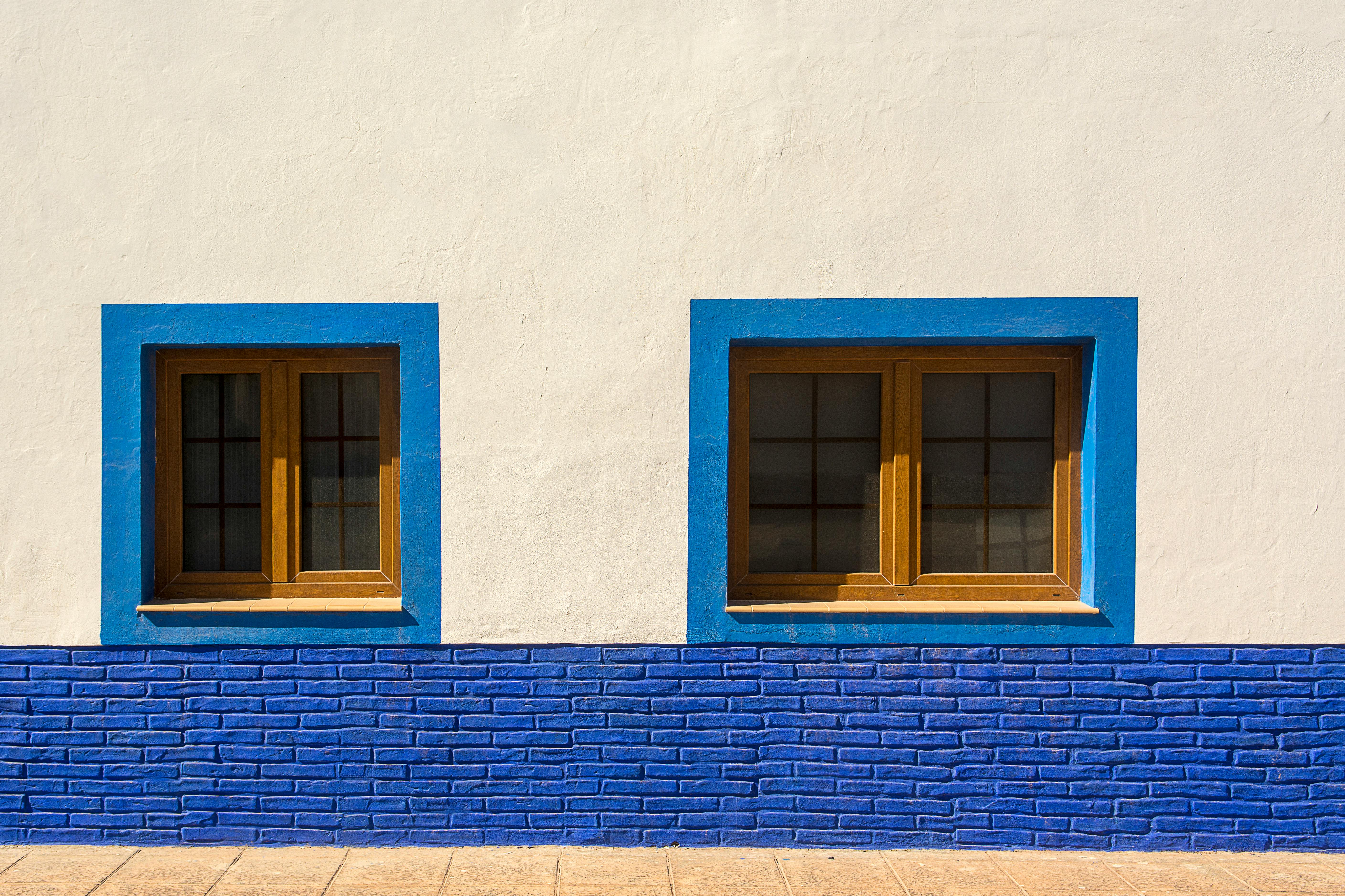 Blue Windows in a House Building · Free Stock Photo