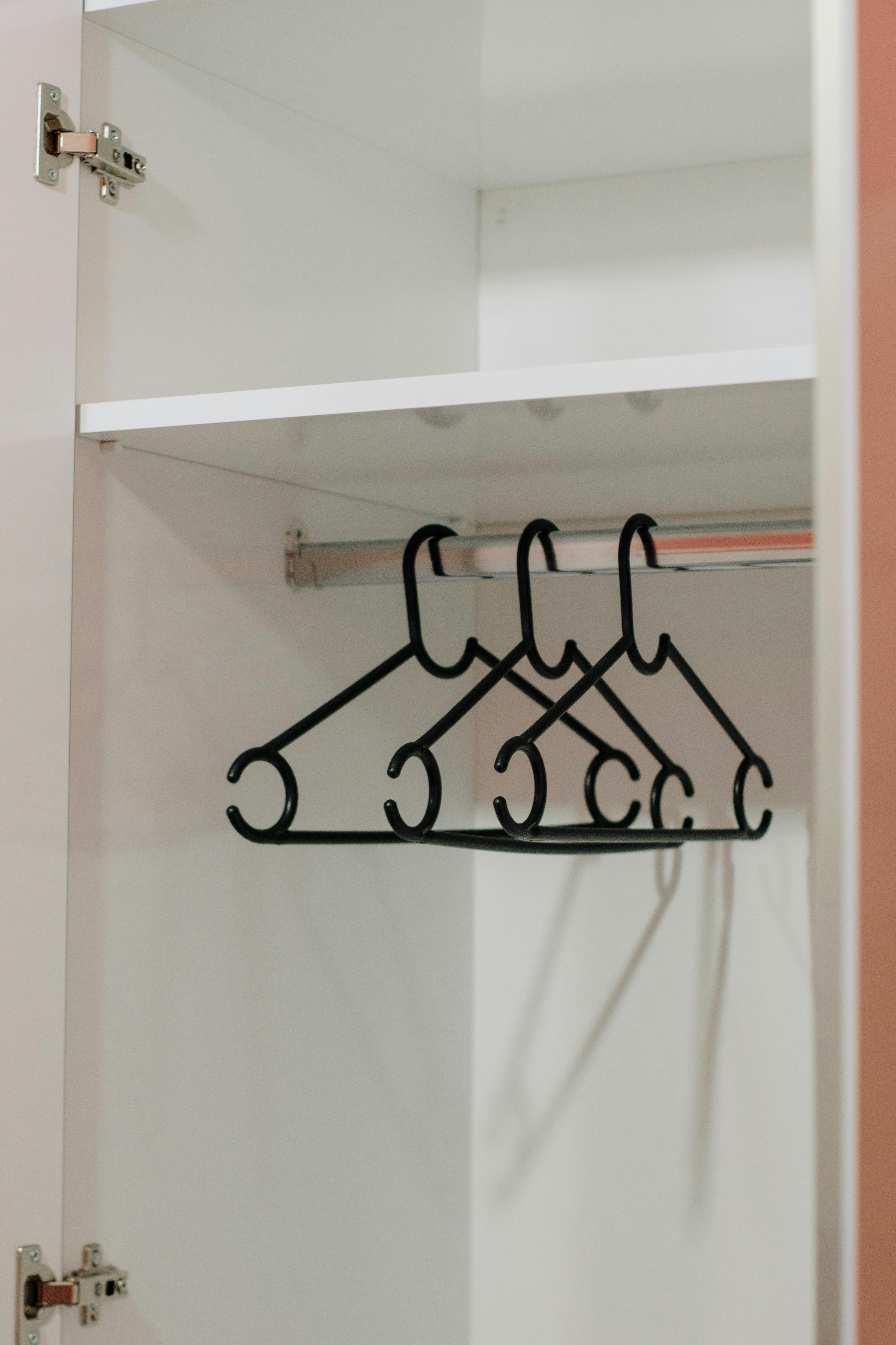 Hangers in a Wardrobe · Free Stock Photo