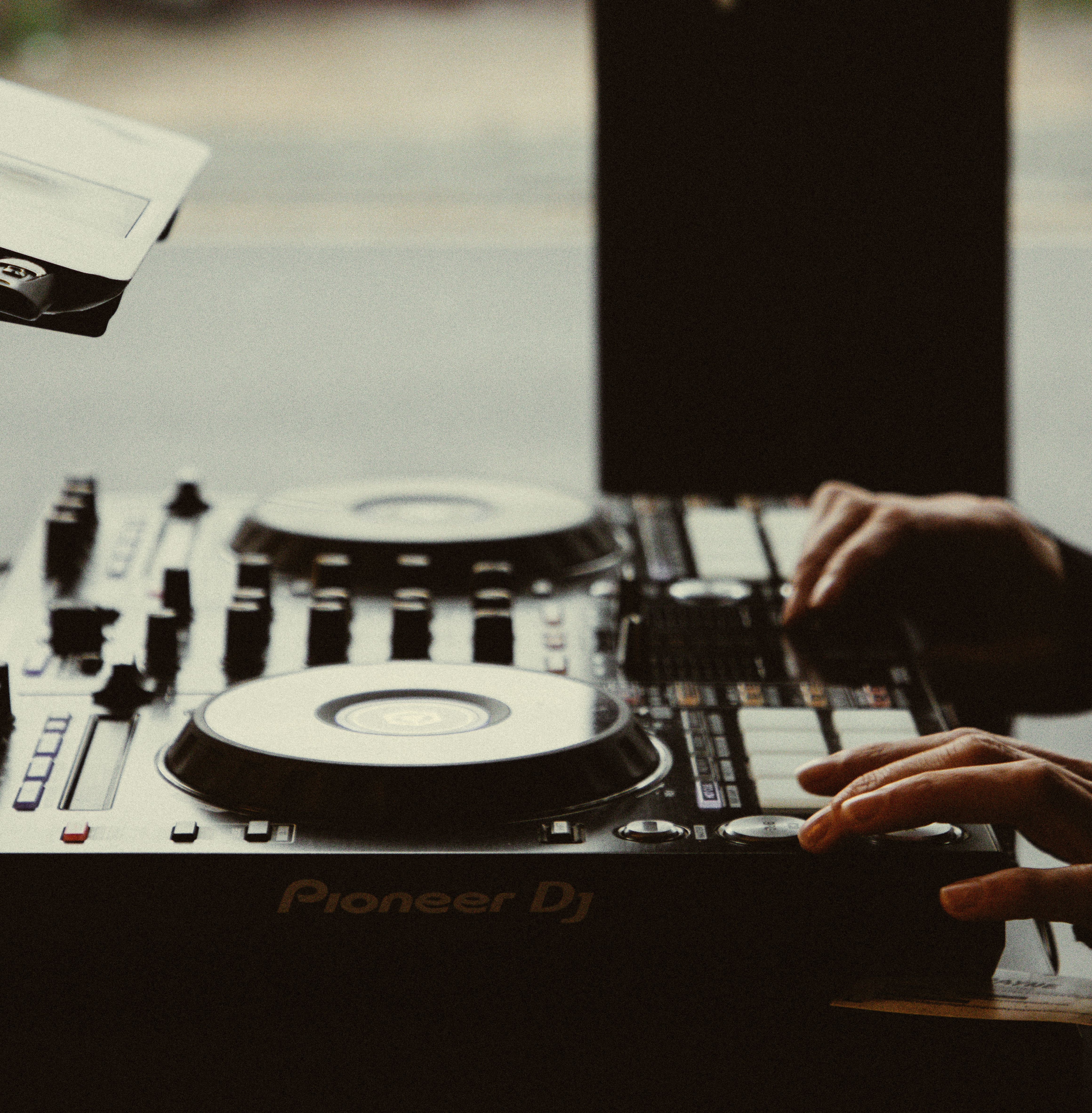 Close-up of Person Hands Playing on DJ Mixer · Free Stock Photo