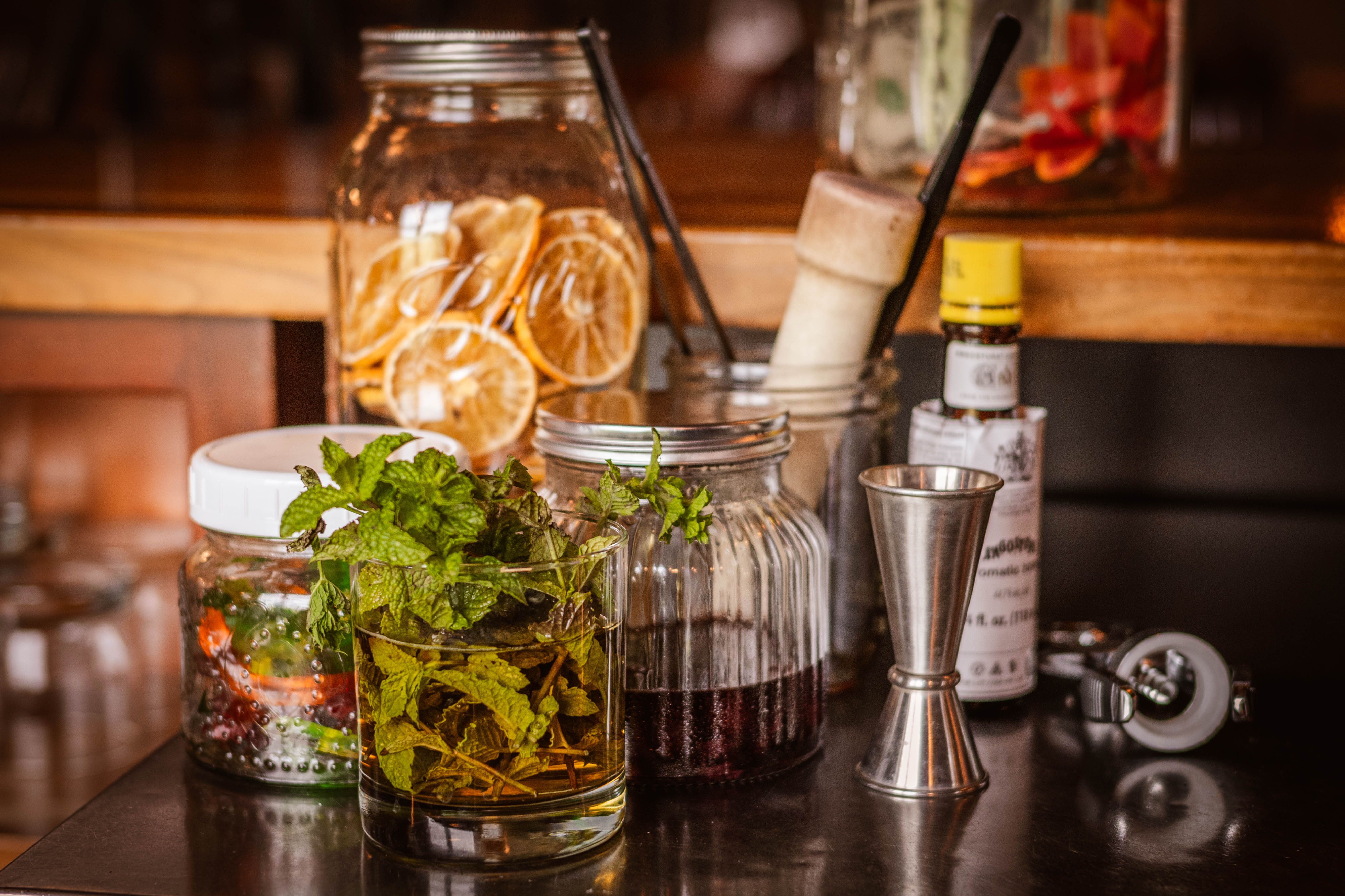 Jars of Cocktail Ingredients and Measuring Cup · Free Stock Photo