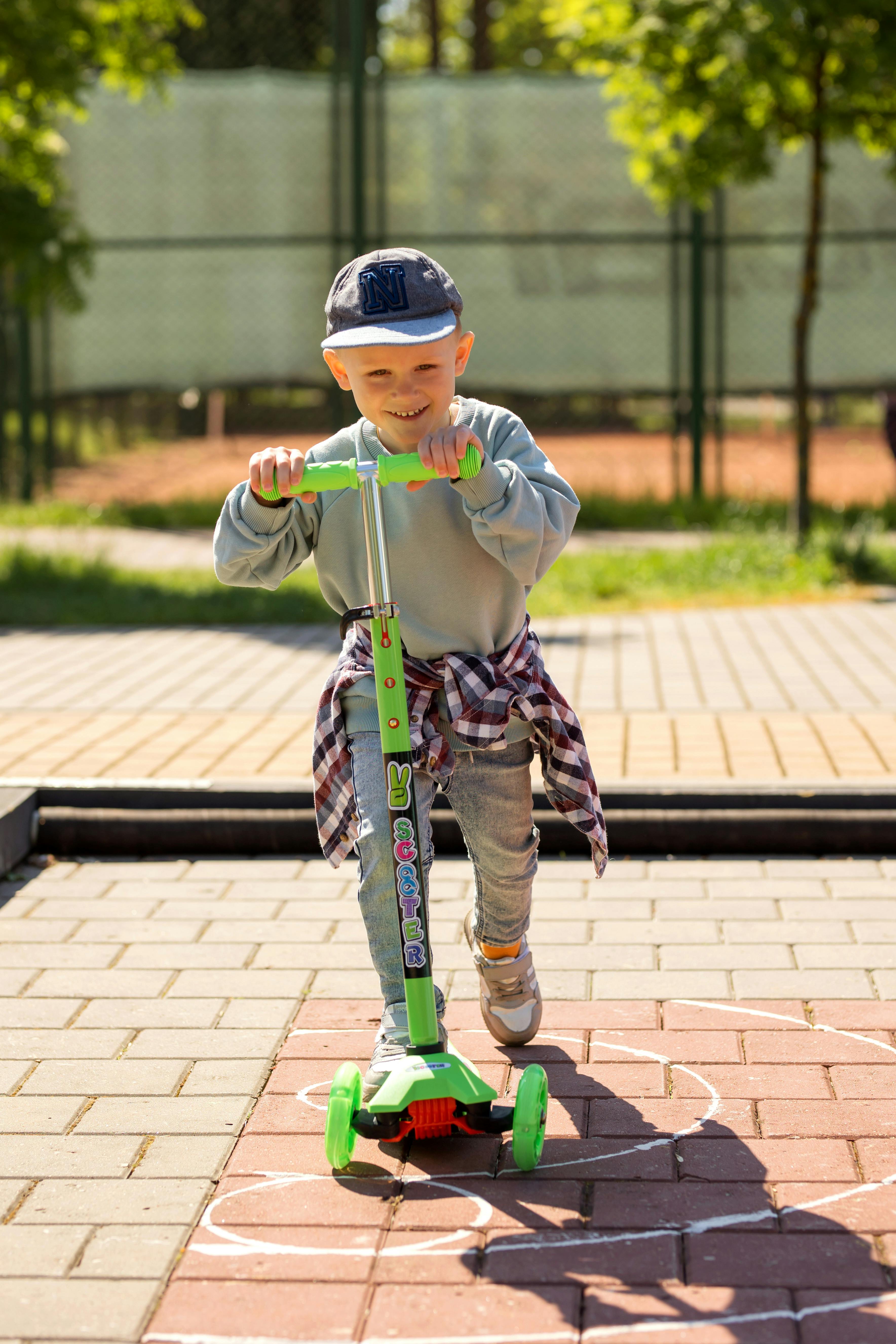 A Boy with a Scooter · Free Stock Photo