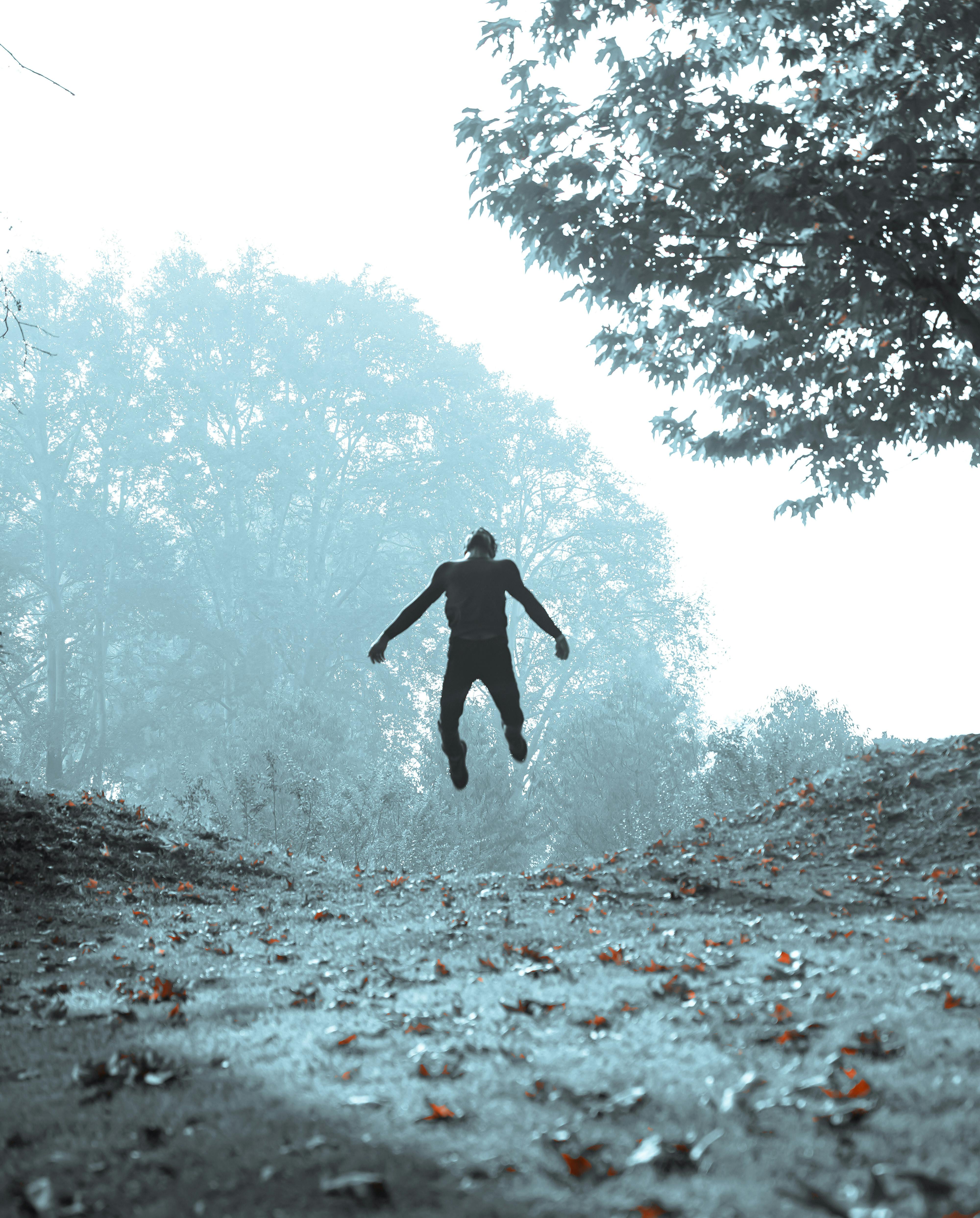 Man Hovering over Ground · Free Stock Photo