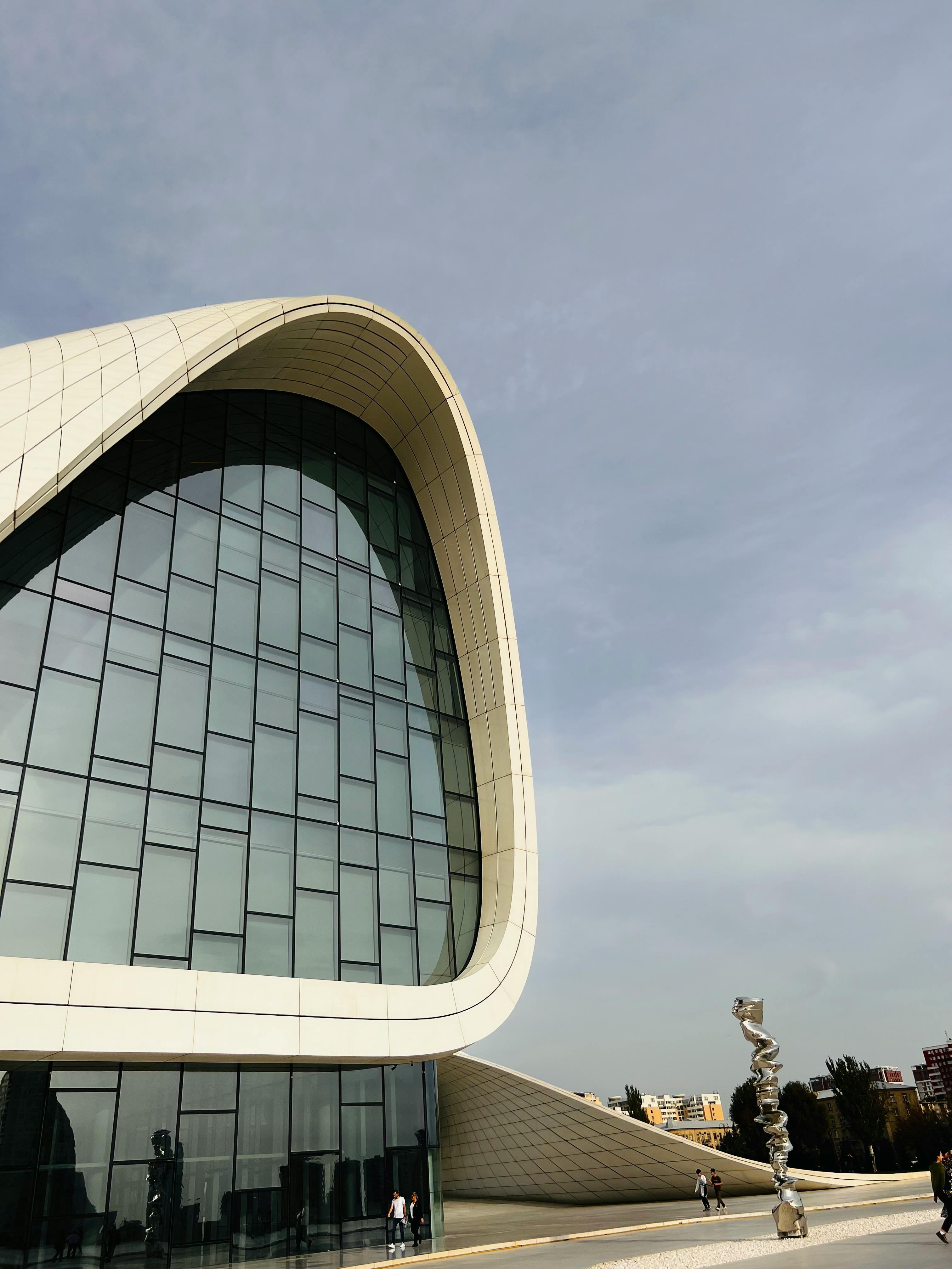 Brown High Rise Building Surrounded by People · Free Stock Photo