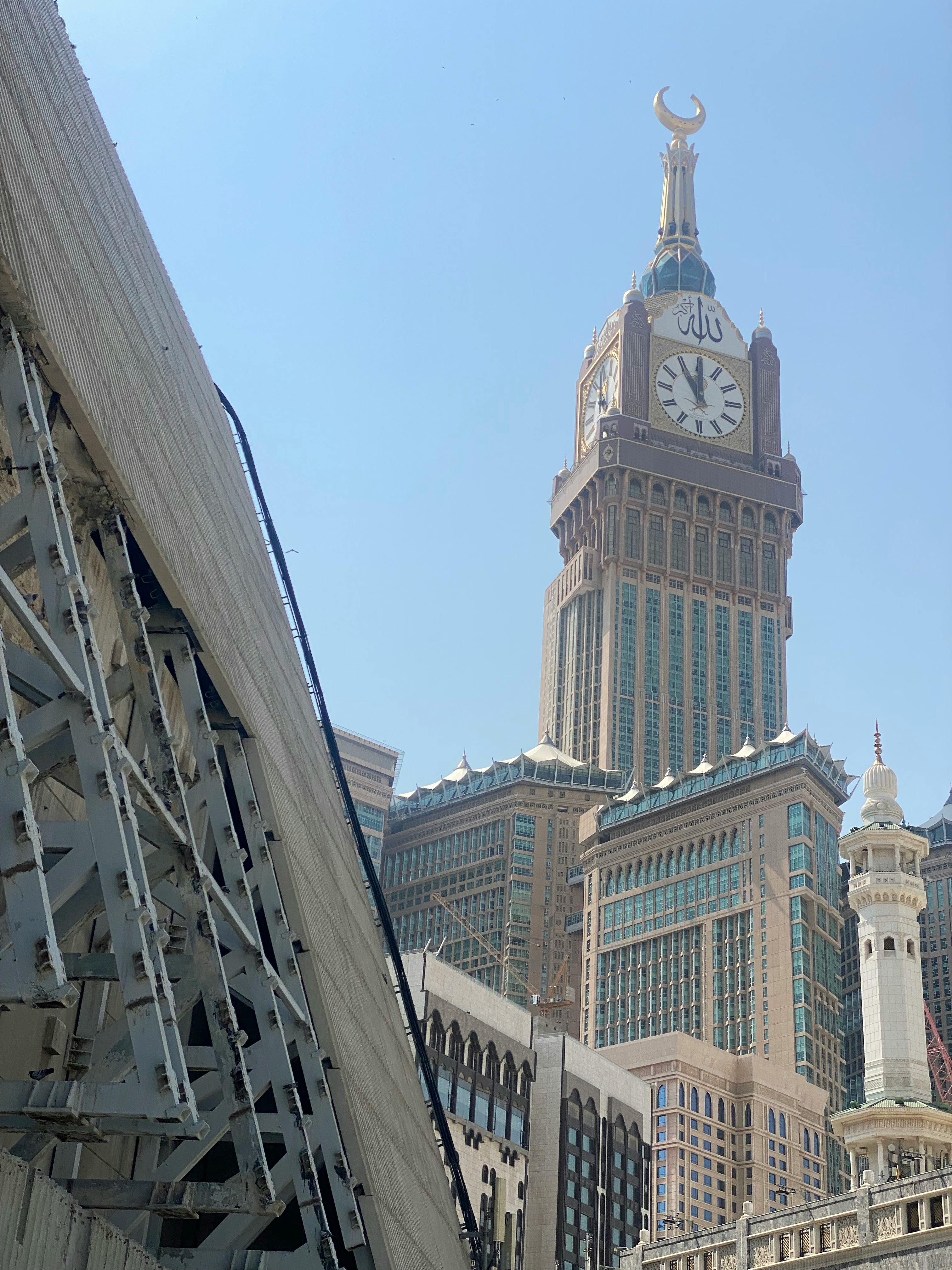 Photo of an Illuminating Makkah Royal Clock Tower at Night, Mecca ...
