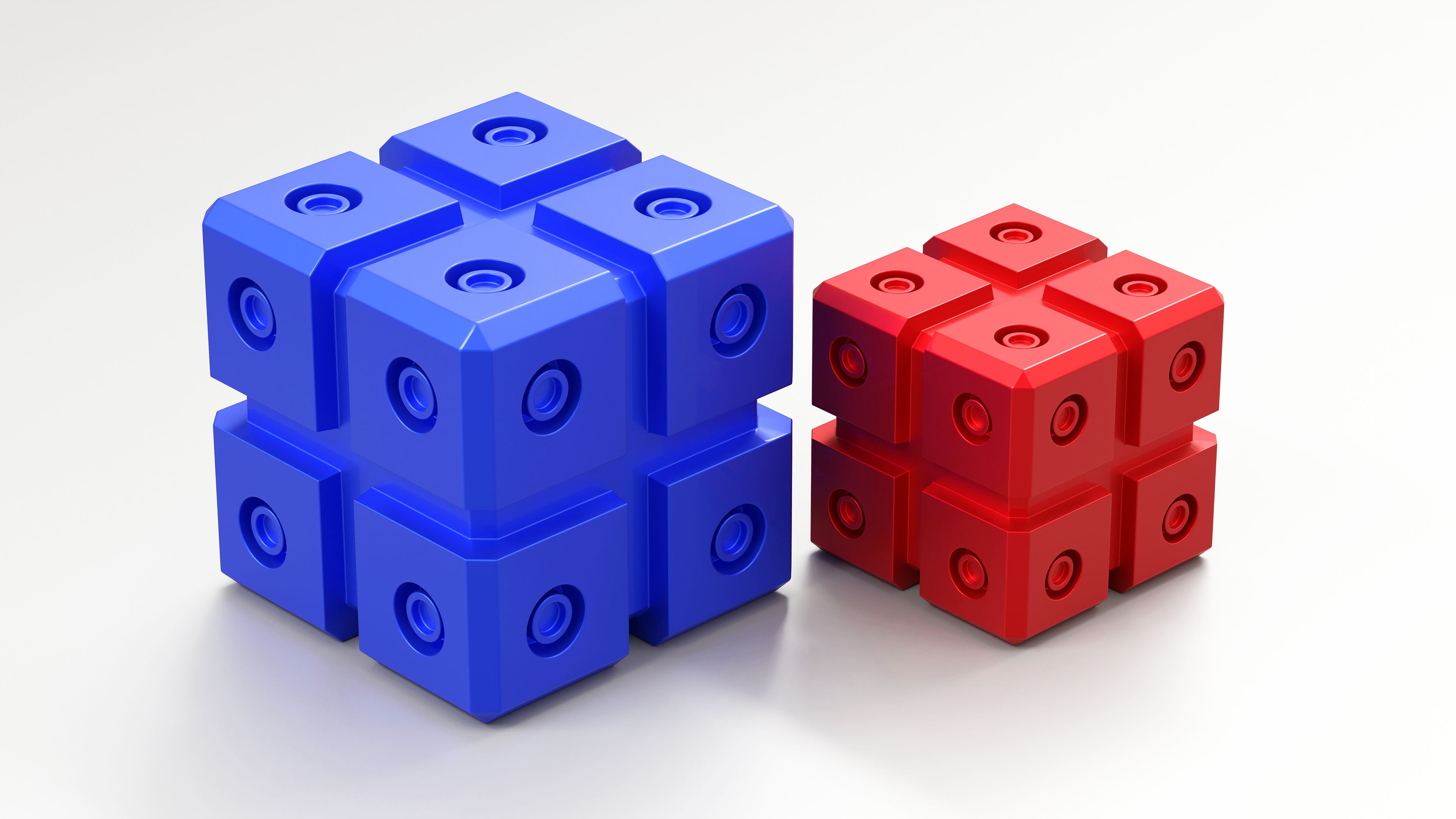Un Par De Cubos Azules Y Rojos Renderizados Sobre Una Superficie Blanca ...