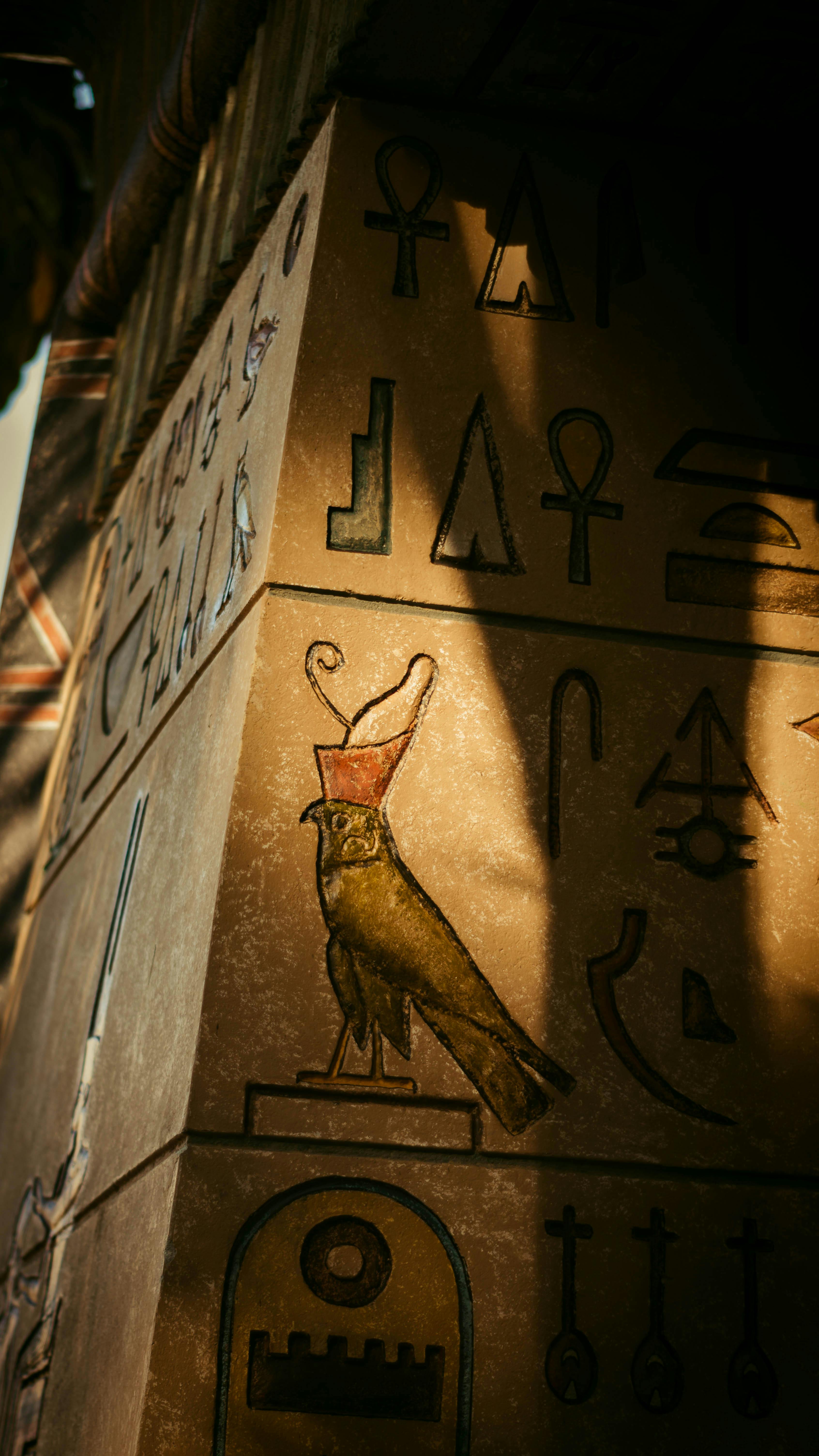 Egyptian Hieroglyphs with the Symbol of Horus on a Pillar · Free Stock ...