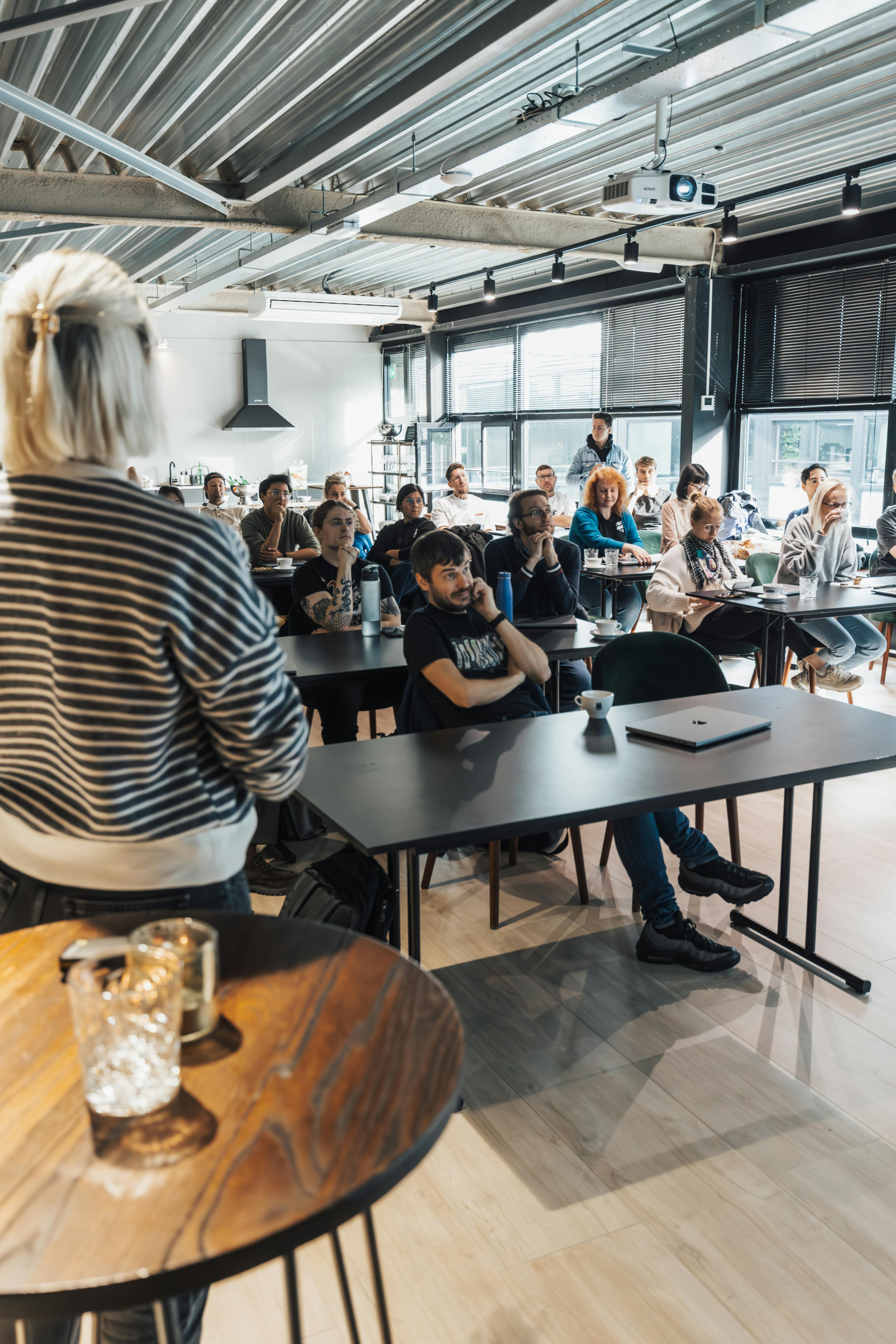 Man Giving a Presentation to a Group of People · Free Stock Photo