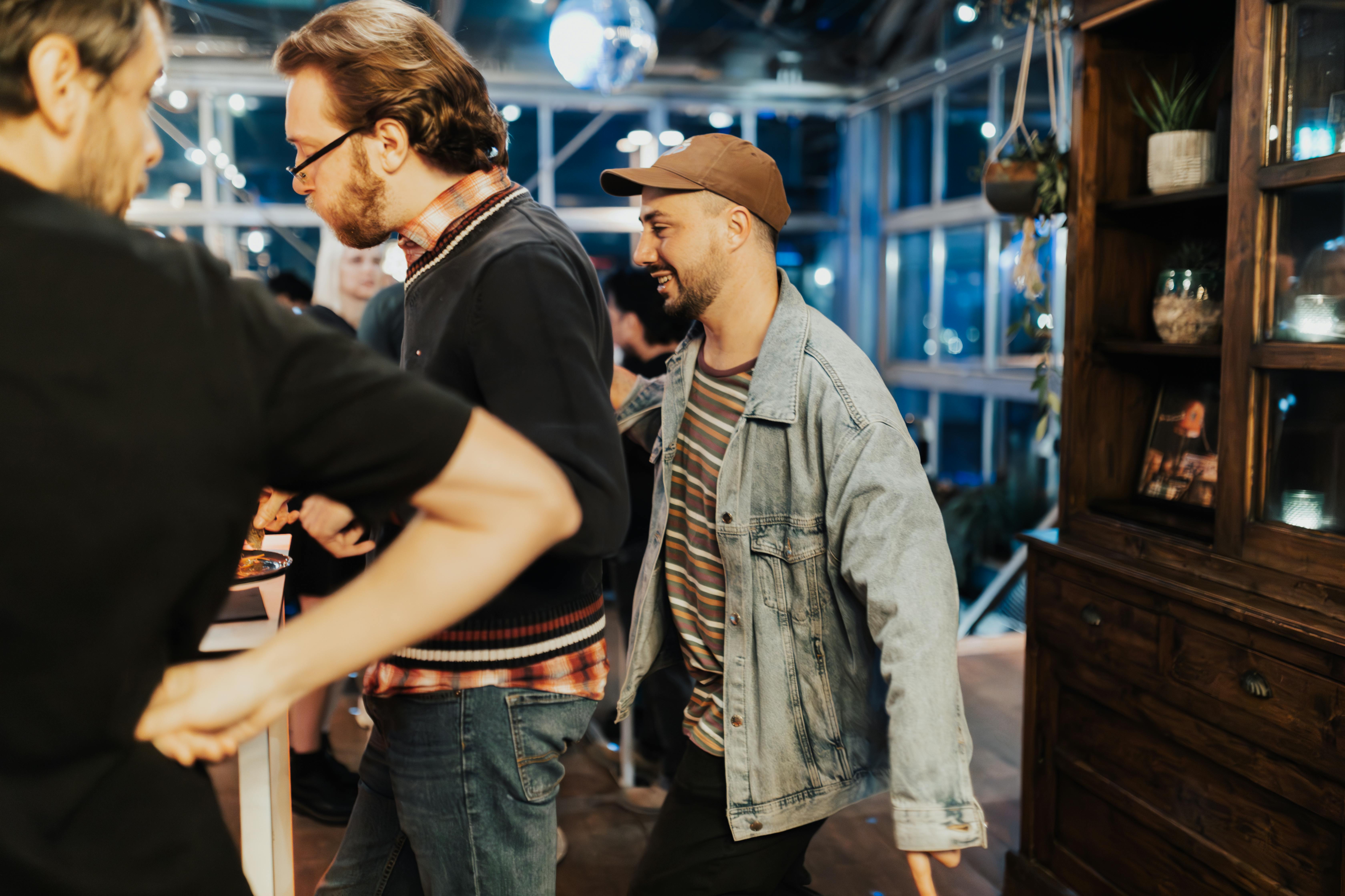 Group of Men in a Bar · Free Stock Photo