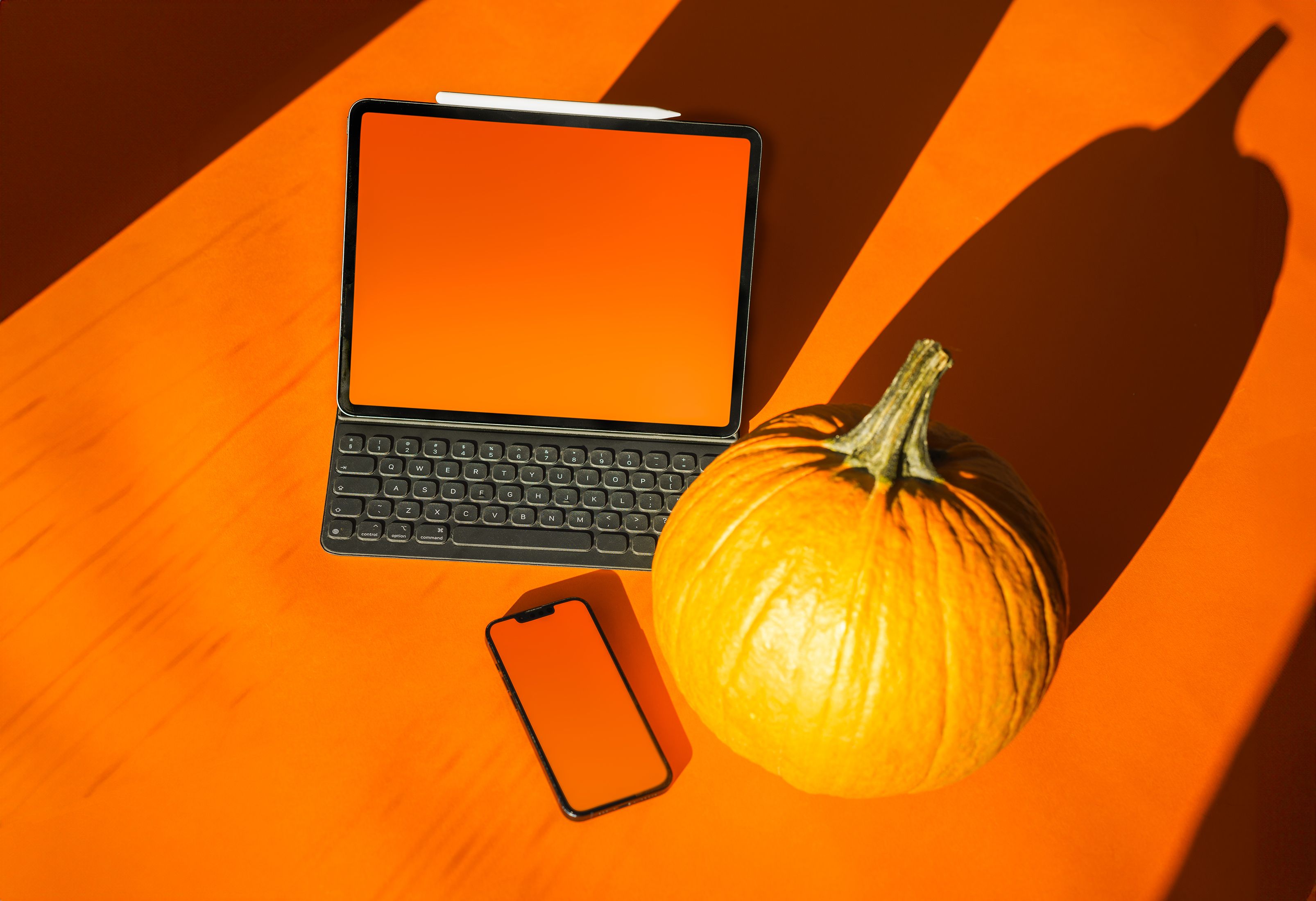 Pumpkin by Laptop and Smartphone · Free Stock Photo
