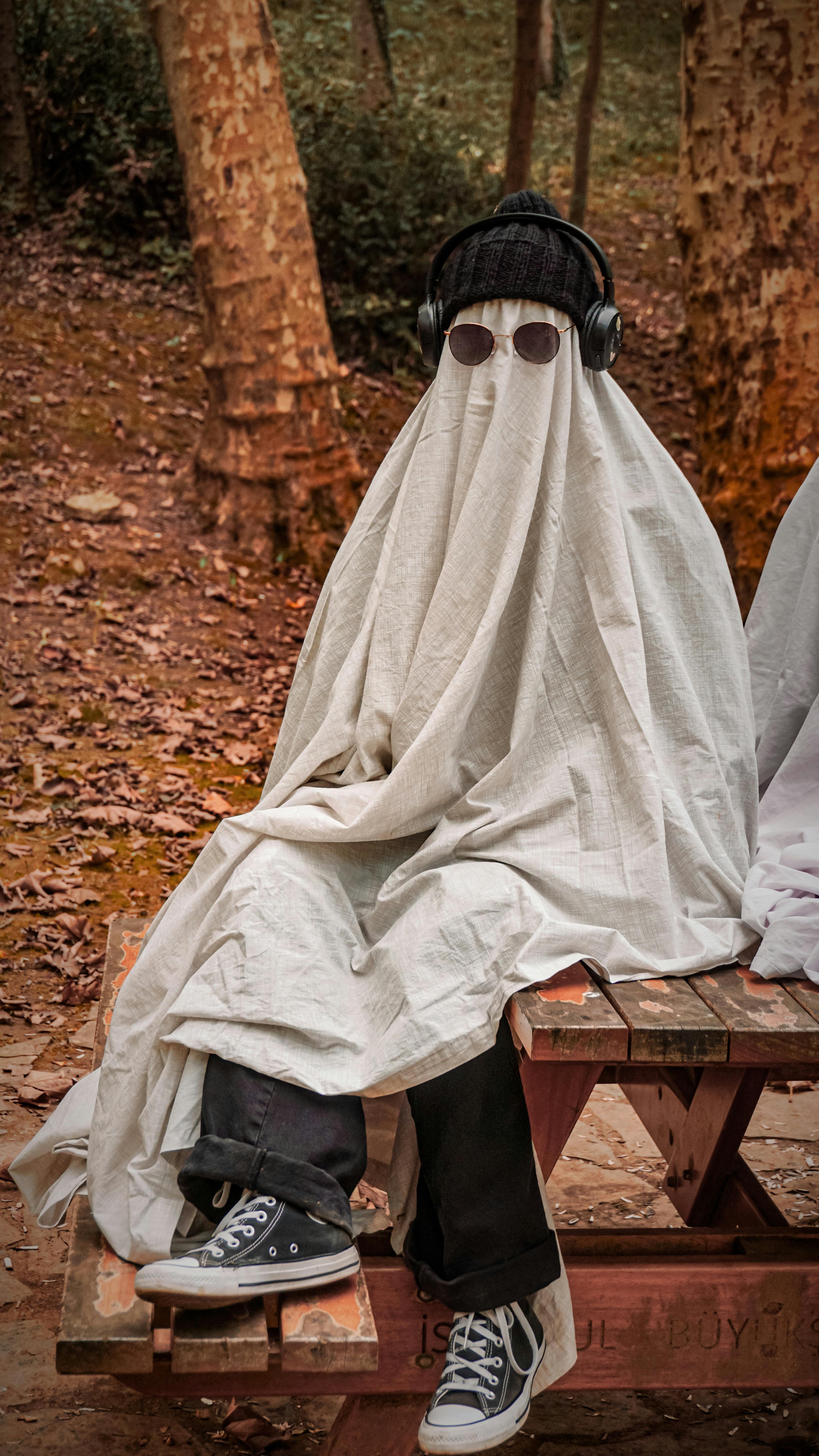 Ghosts Eating Doritos on the Hood of a Haunted Car · Free Stock Photo