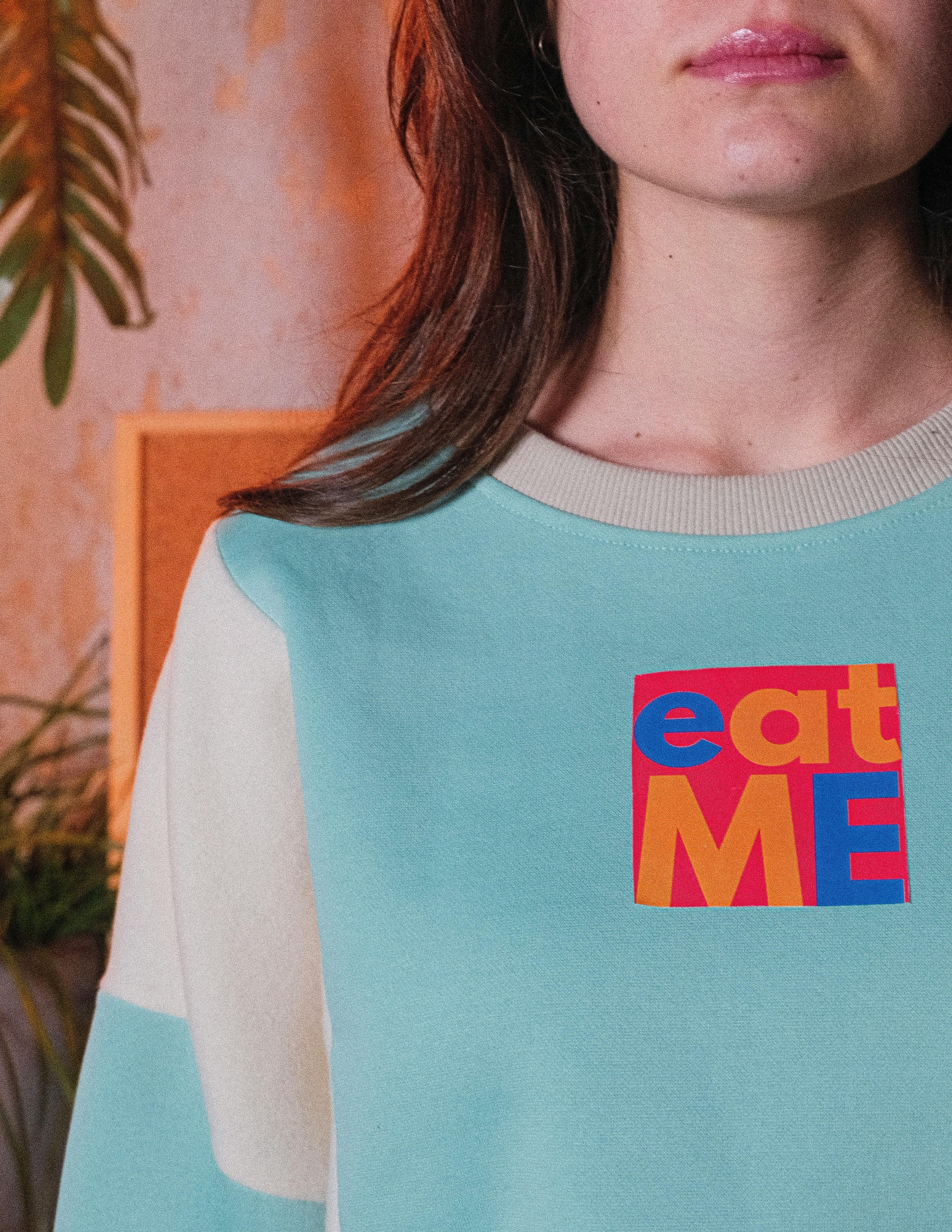 Woman Wearing Graphic Jumper · Free Stock Photo