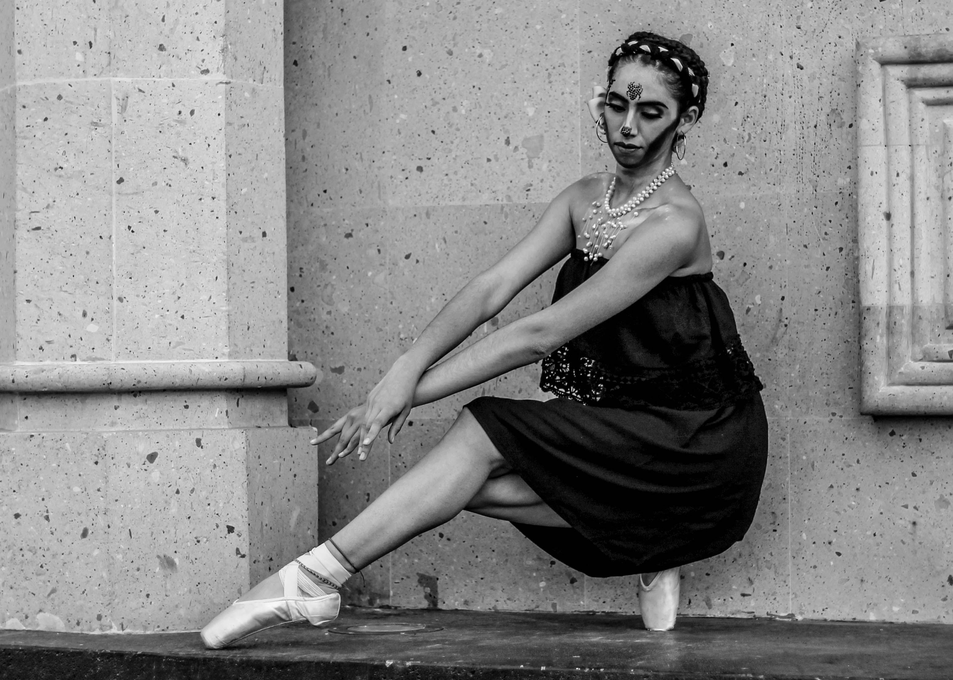 Person in Ballet Pose Wearing Elaborate Facial Make-Up · Free Stock Photo