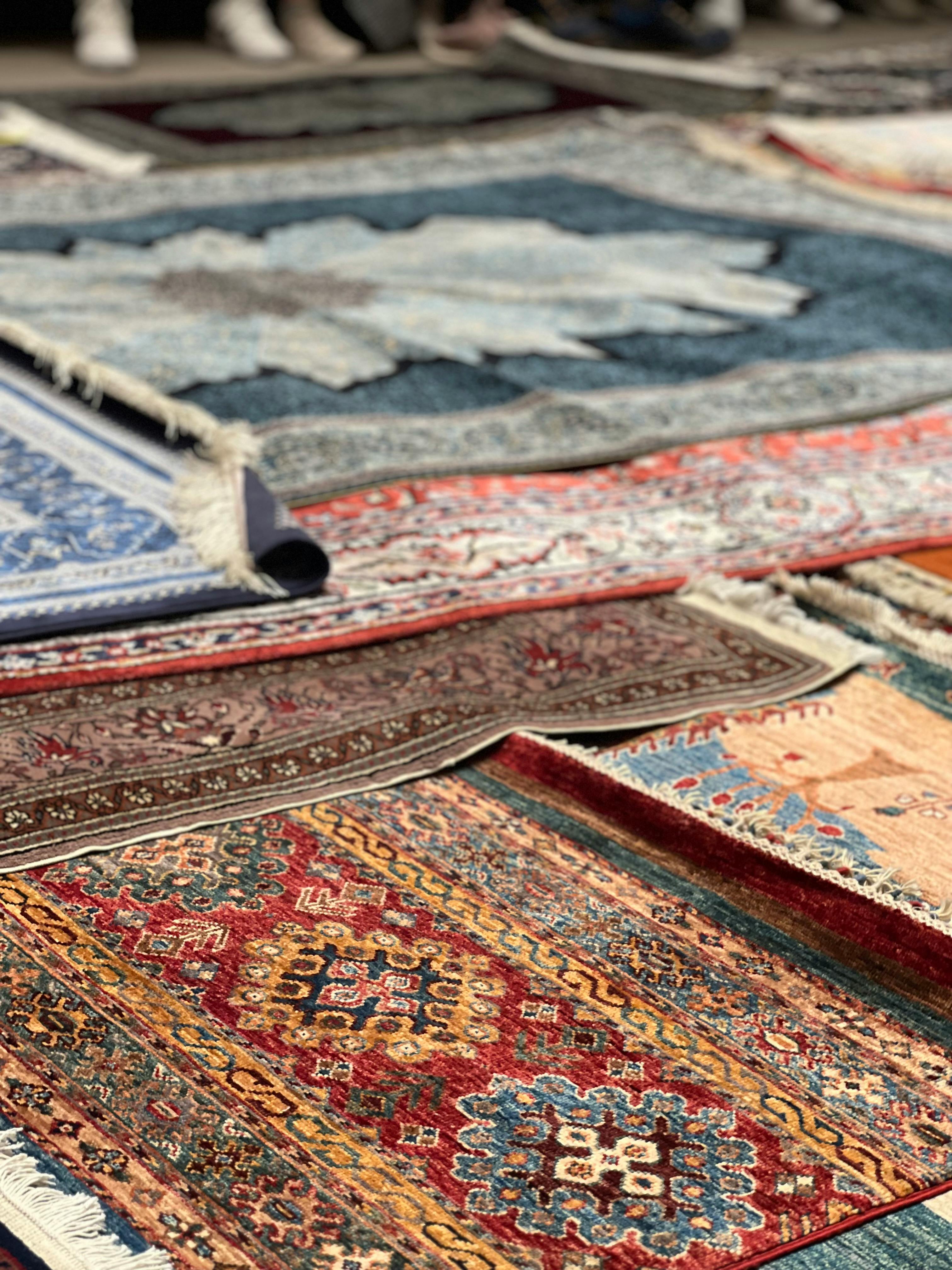 Handmade Colorful Rugs on a Market · Free Stock Photo