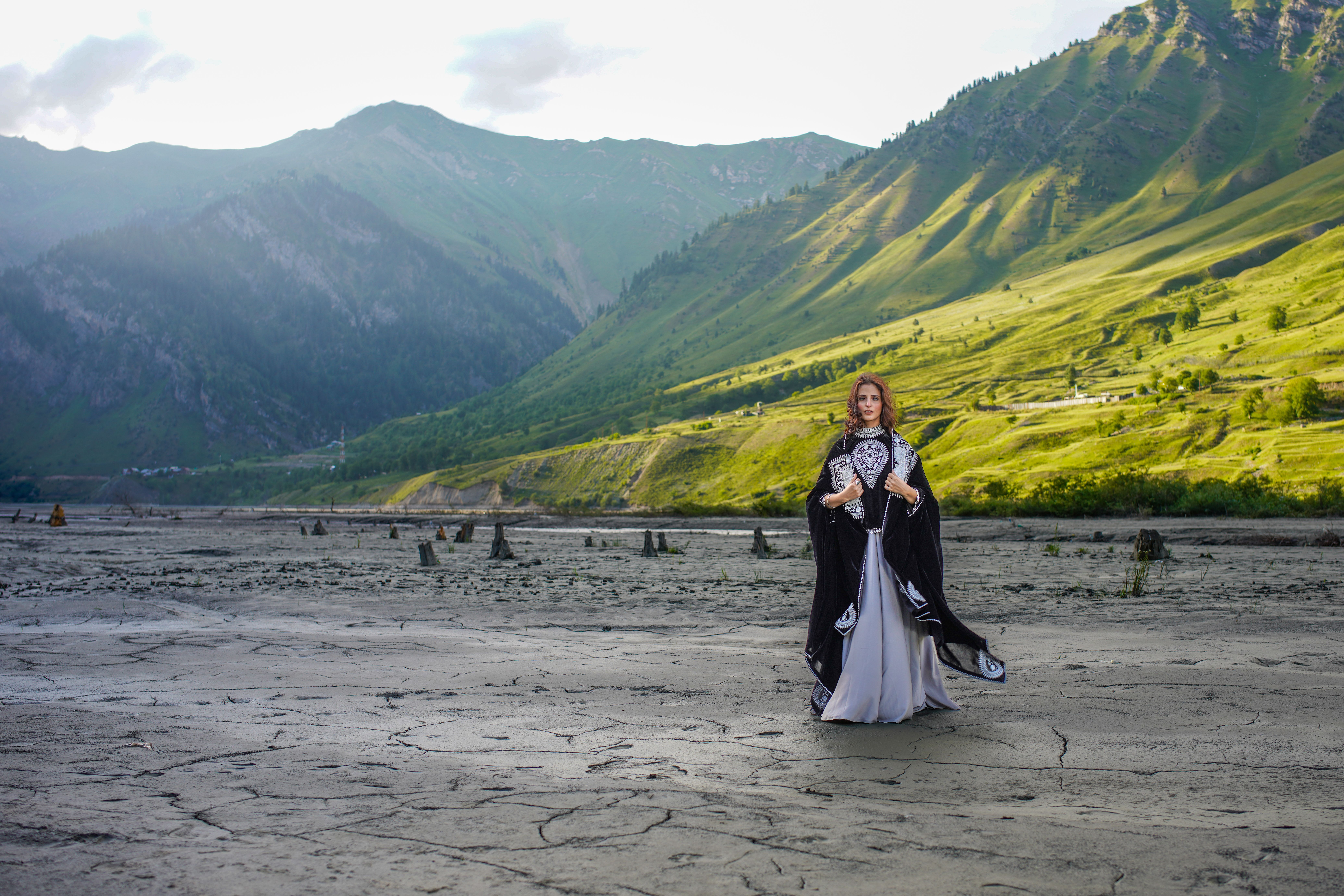 Woman Wearing Robe in a Valley · Free Stock Photo