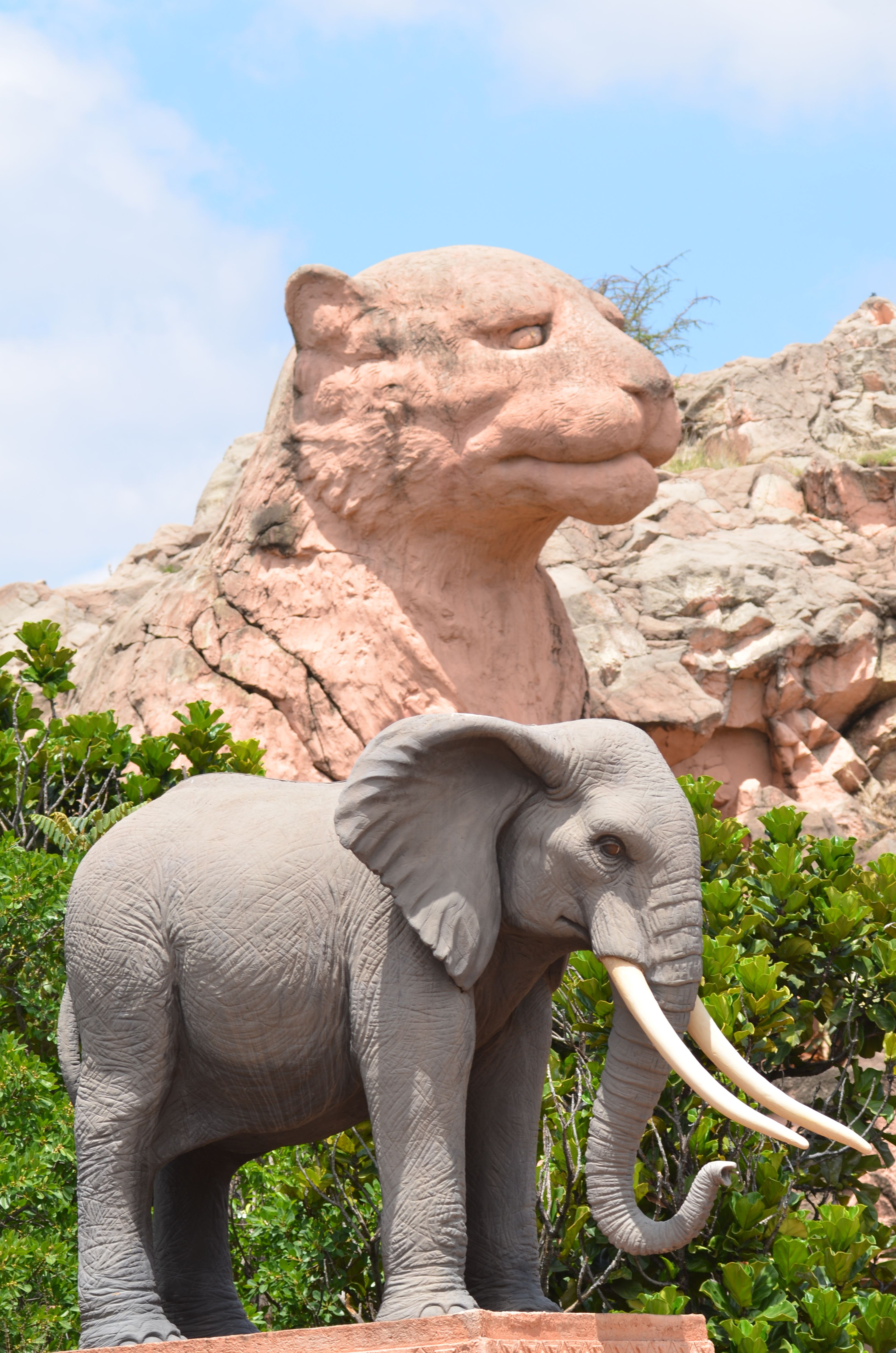 One of African Elephant Statues on the Bridge of Time and a Tiger ...