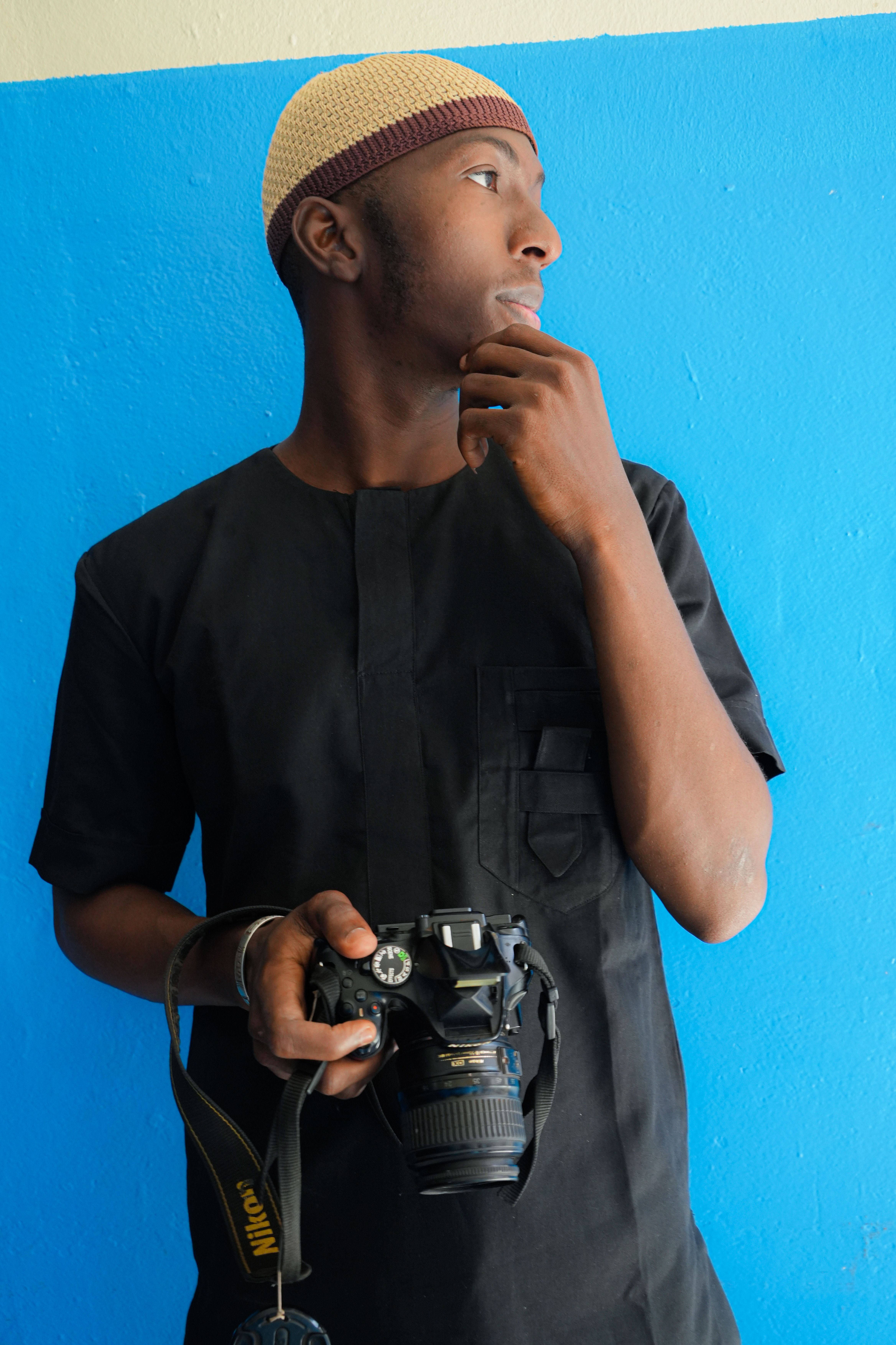 Man Standing with Camera · Free Stock Photo