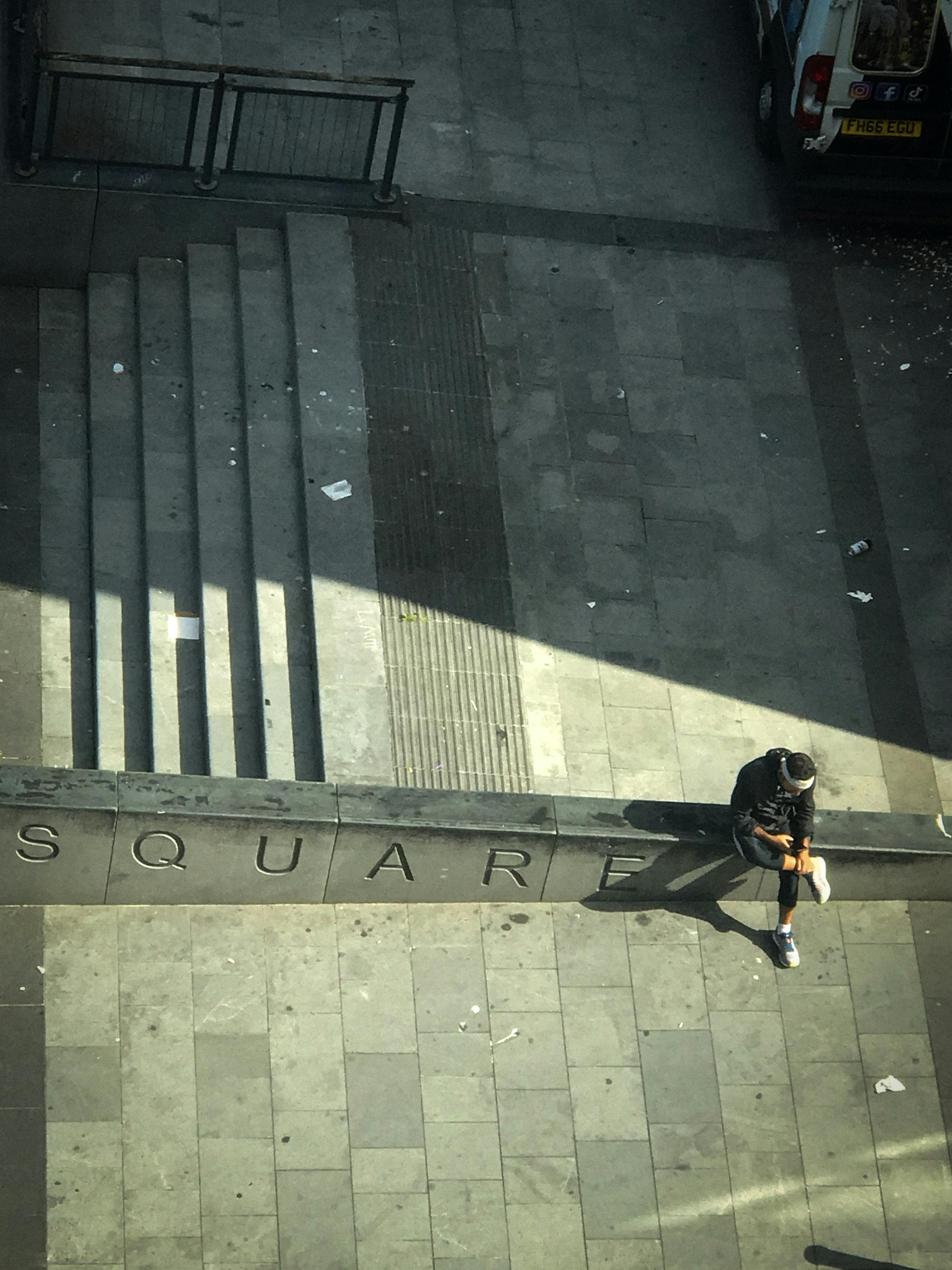 Woman Wearing Oversized Jumper on Stairs · Free Stock Photo
