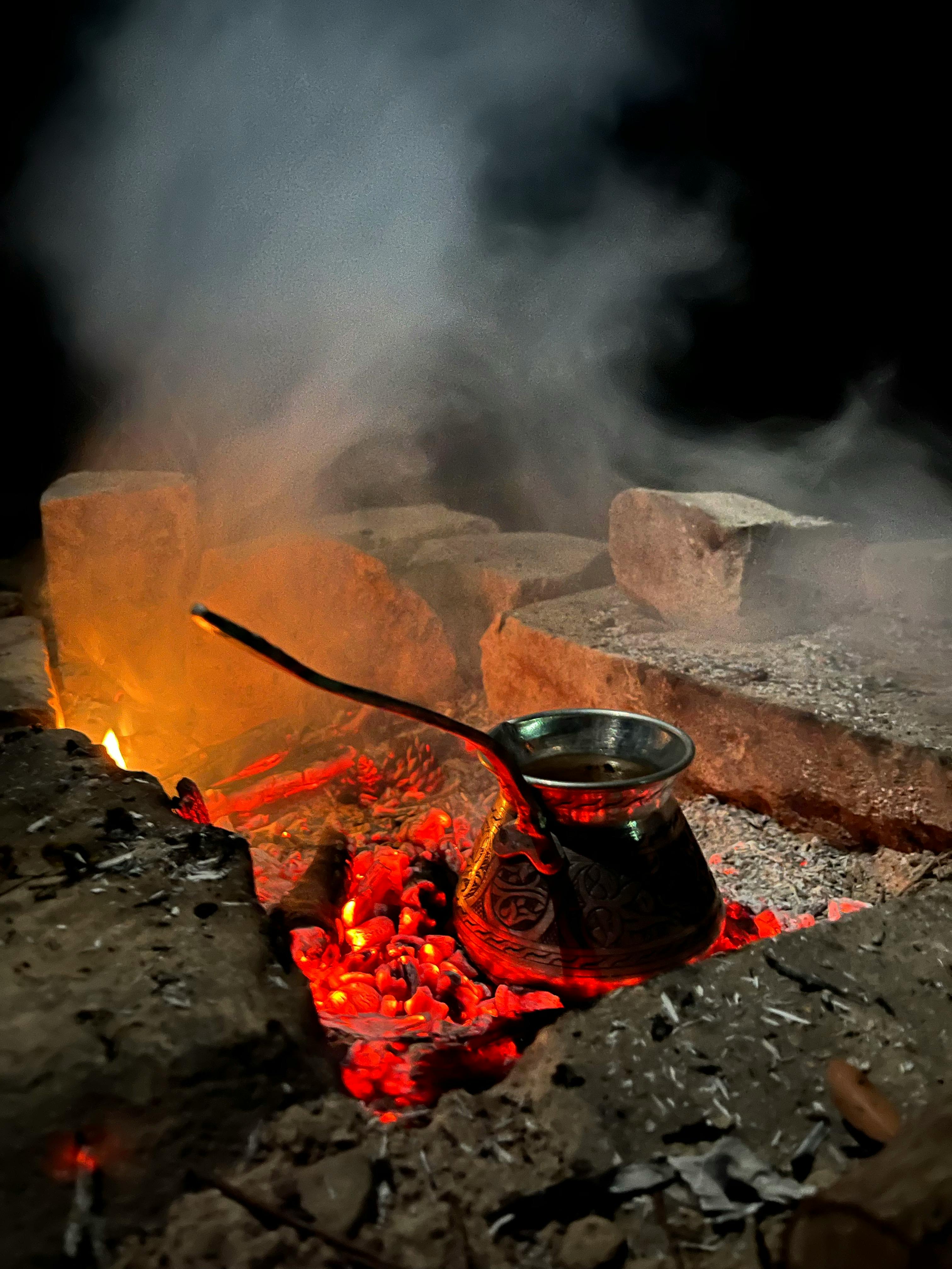 Burning Firelog Surrounded of Pebbles · Free Stock Photo