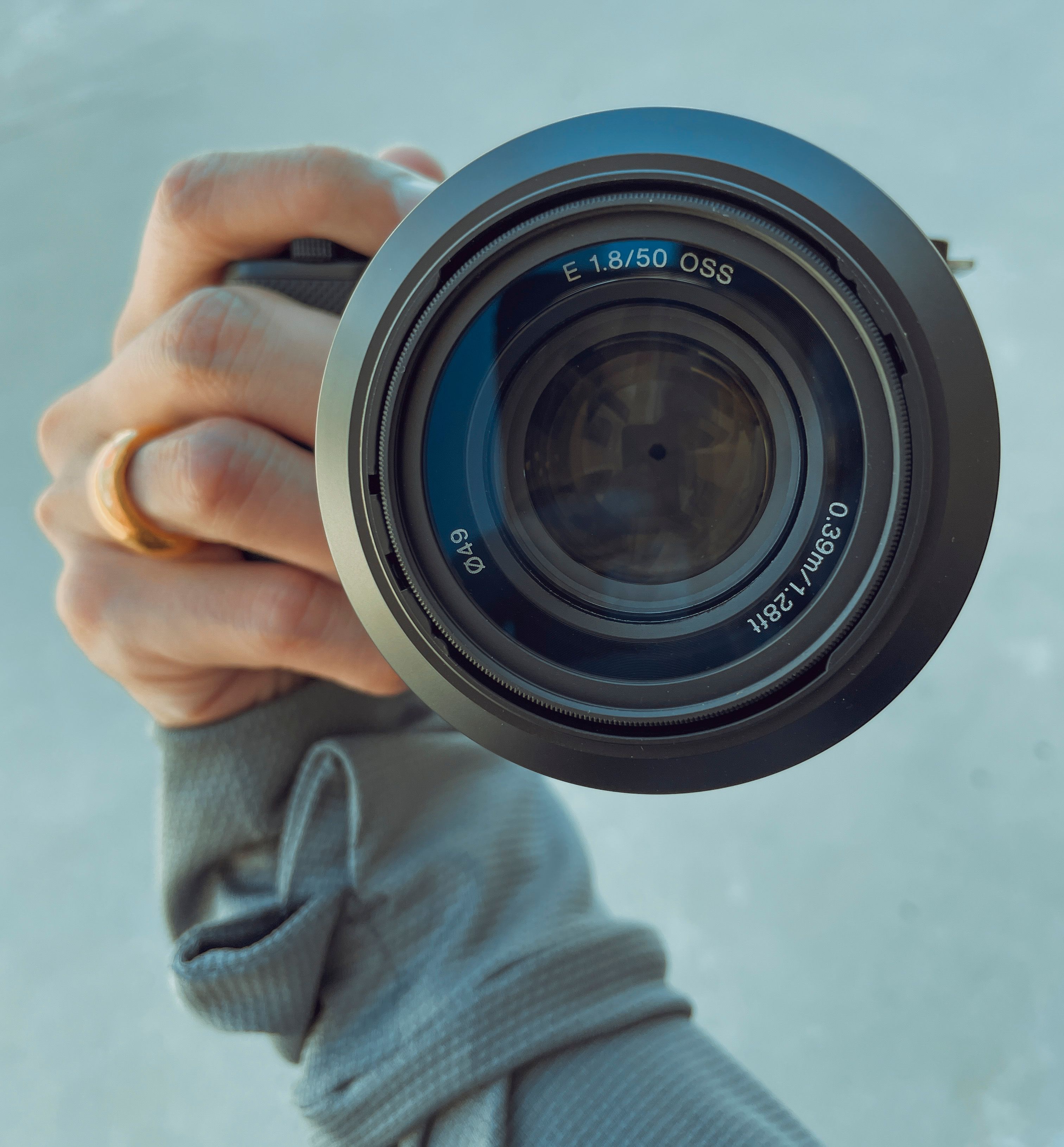 Hand Holding Camera Lens · Free Stock Photo