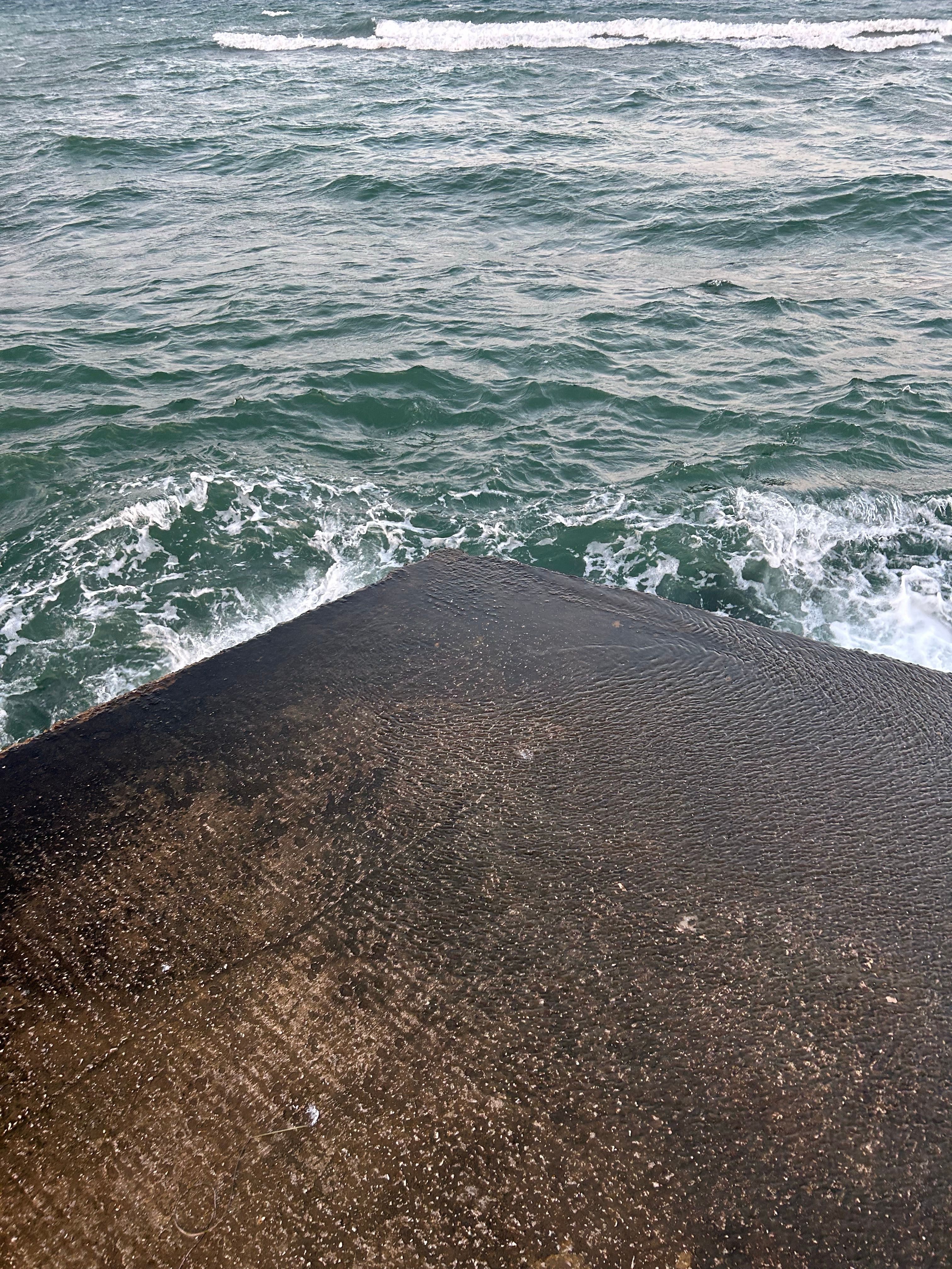 Edge of a Concrete Platform and the Sea · Free Stock Photo
