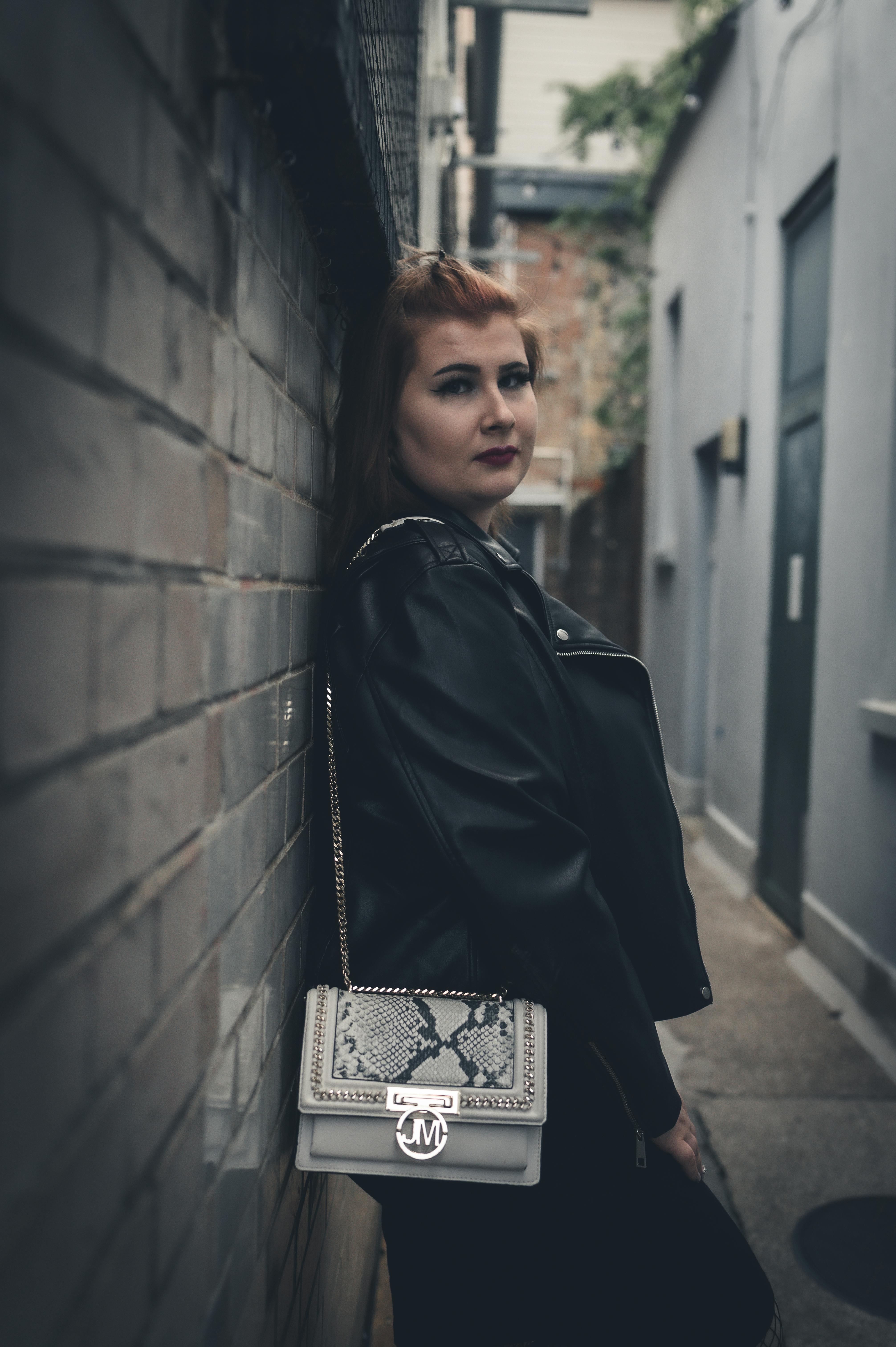 Woman in Black, Leather Jacket and with Bag in Narrow Alley · Free ...