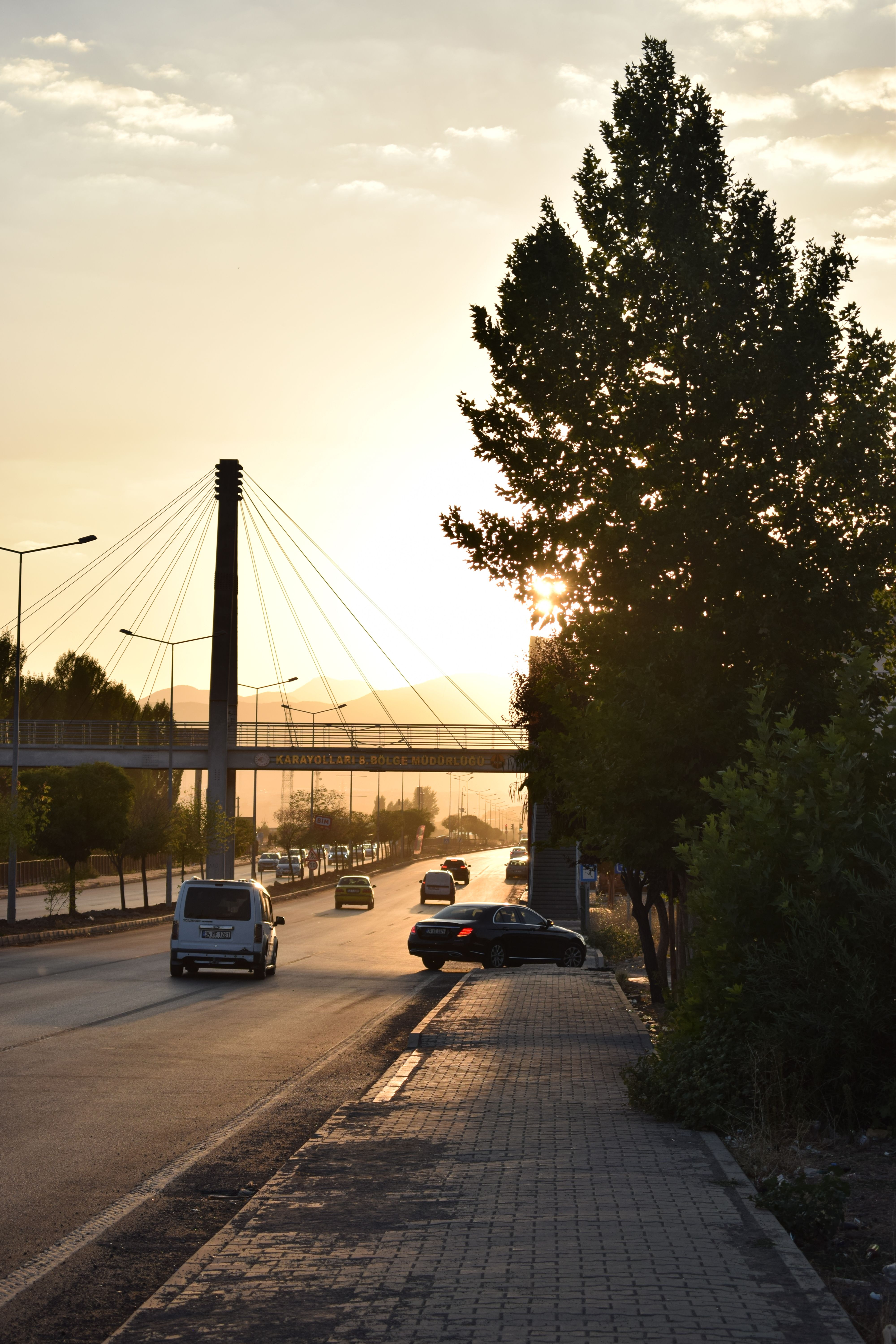Road and Sidewalk at Sunset · Free Stock Photo