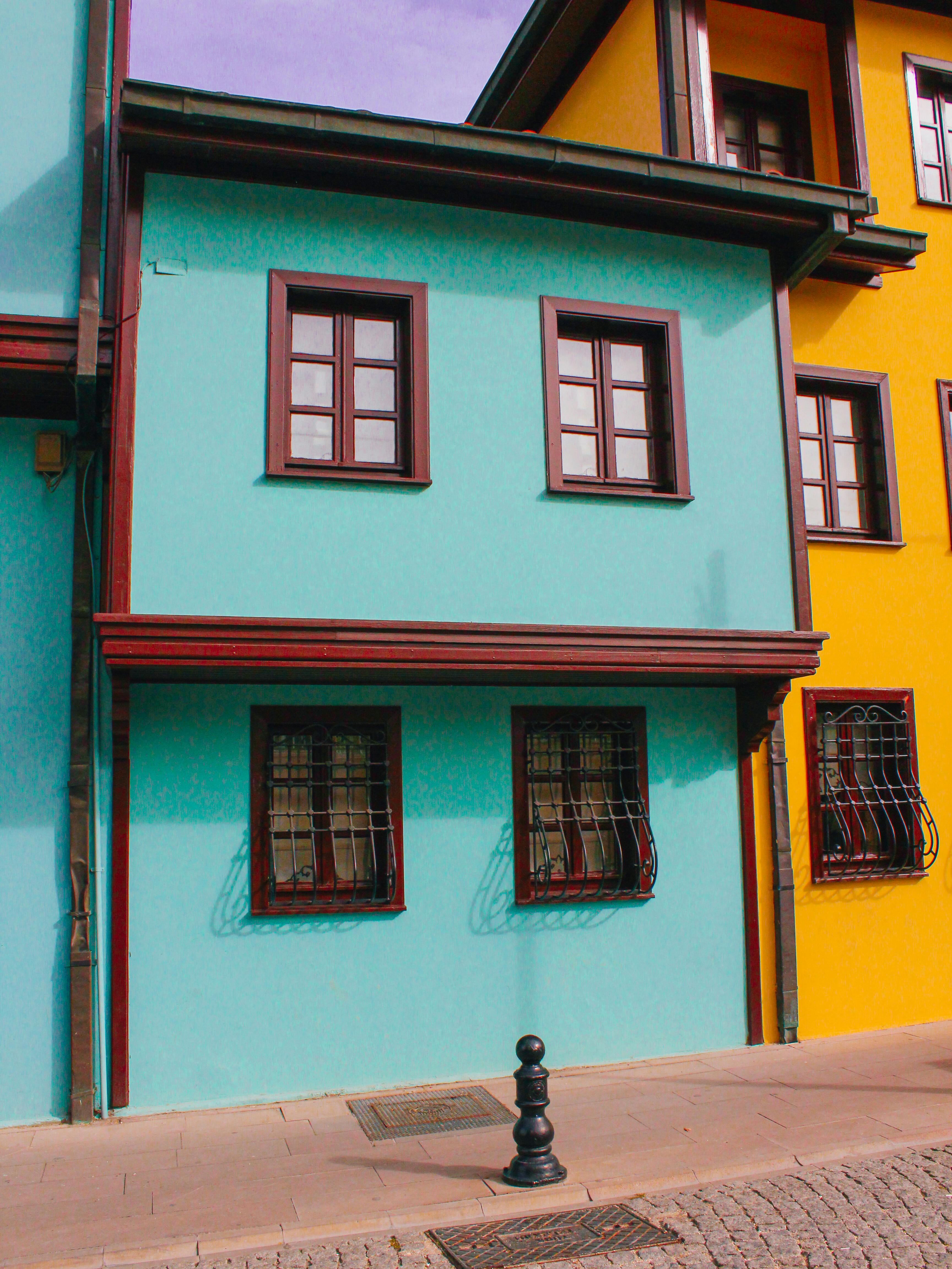 Blue House in Town · Free Stock Photo